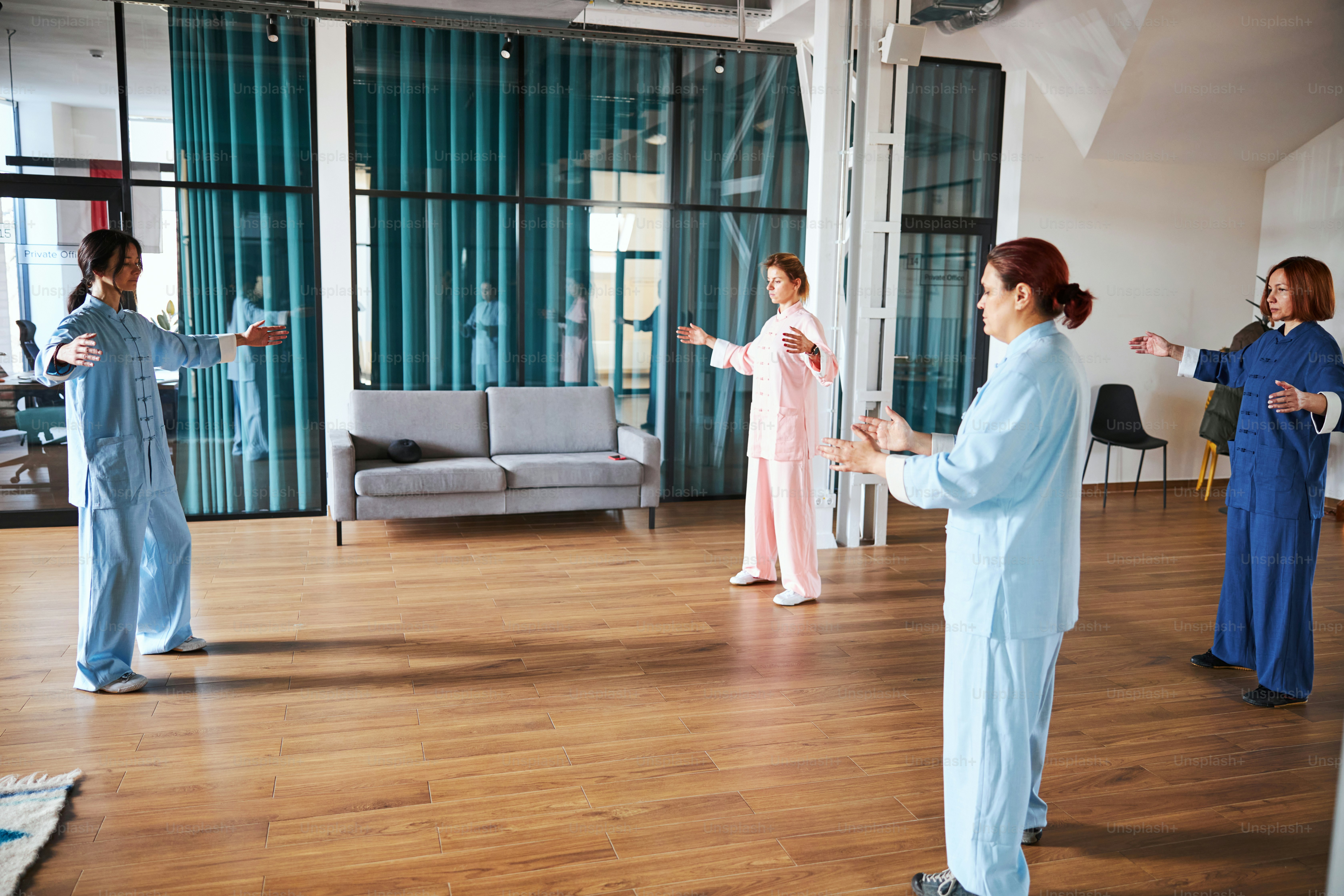 Women in Chinese clothes following their qigong master and opening ...