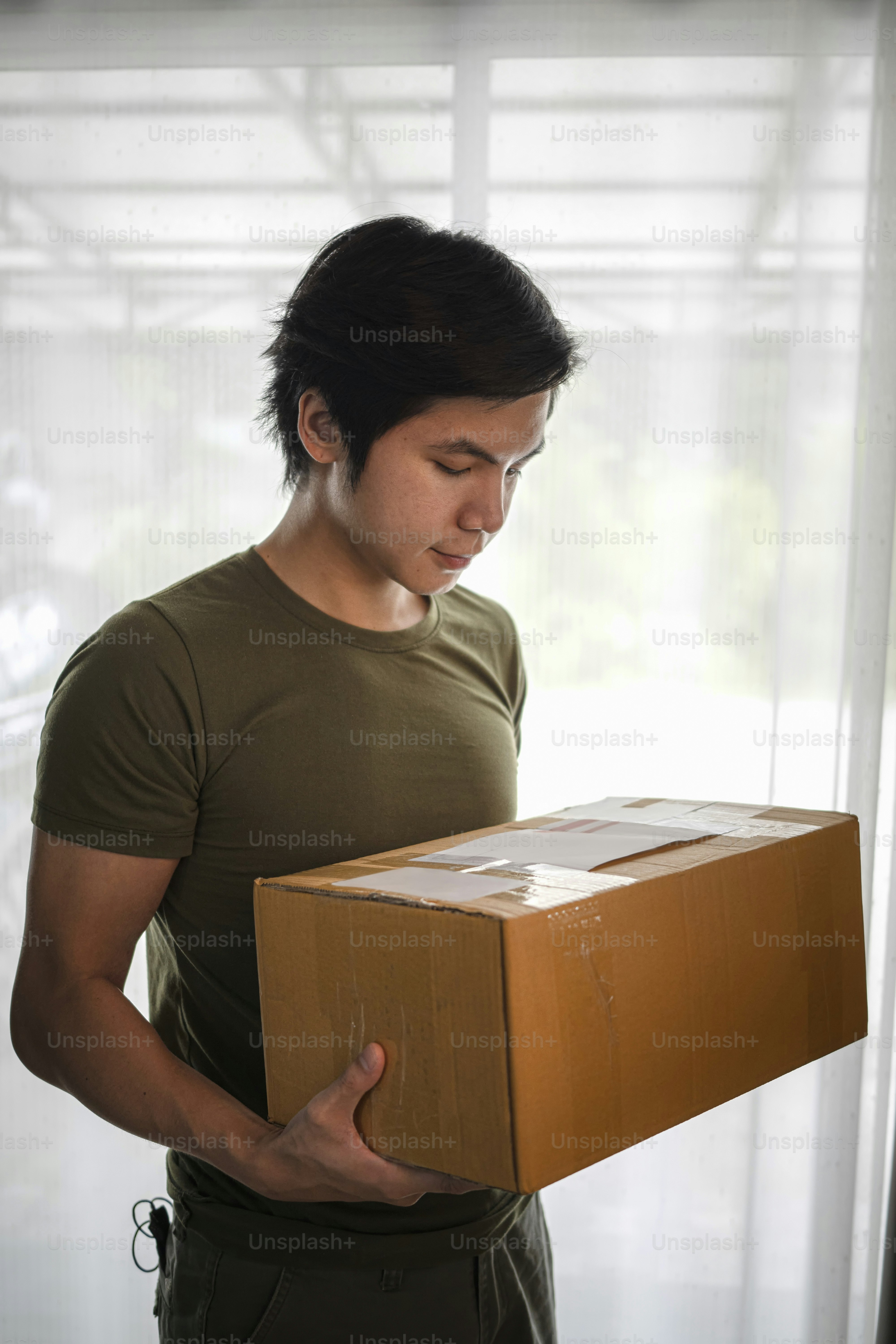 Asian man business owner prepare product packaging cardboard box for ...
