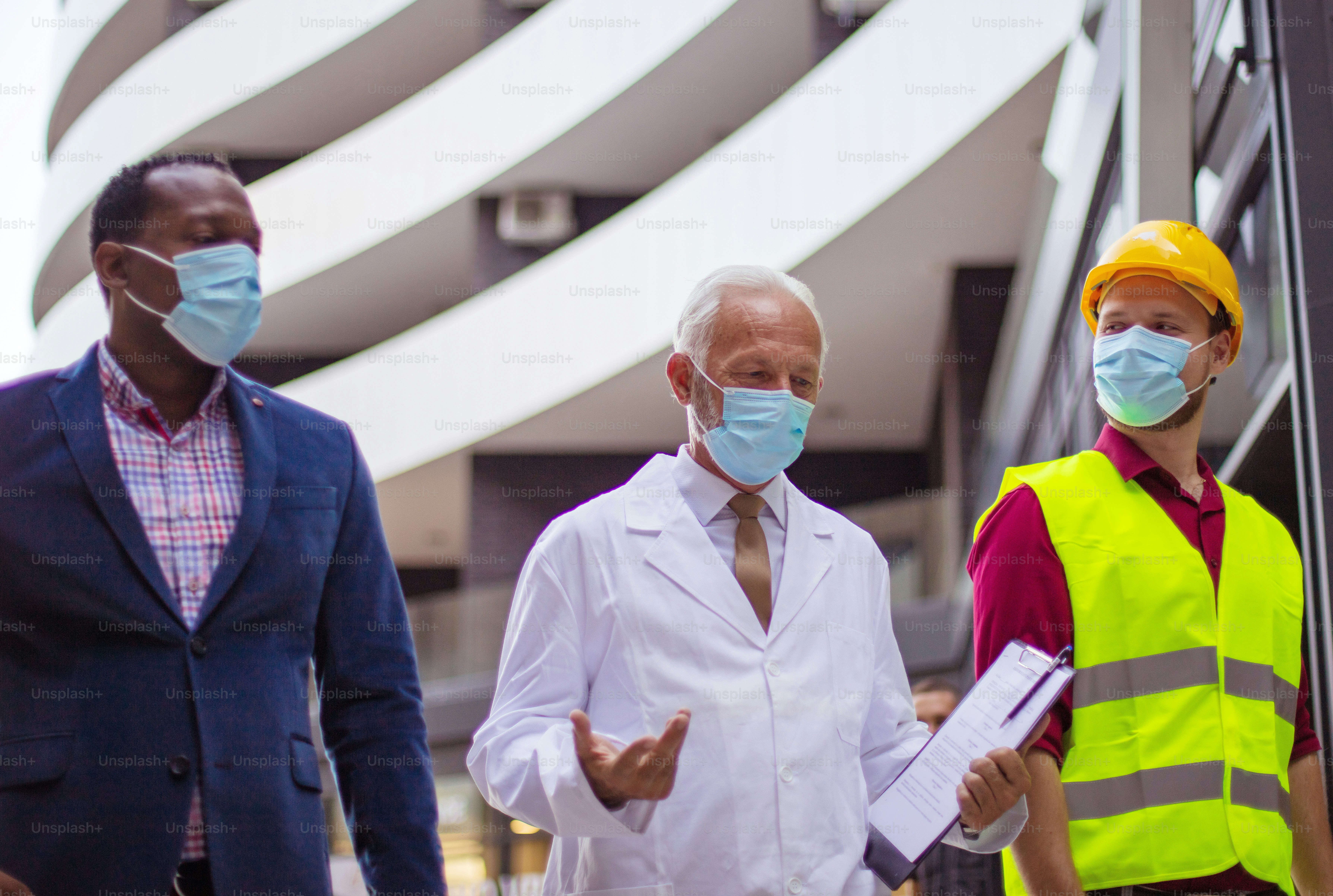 Business man, doctor and engineer talking on street. photo – Black men ...