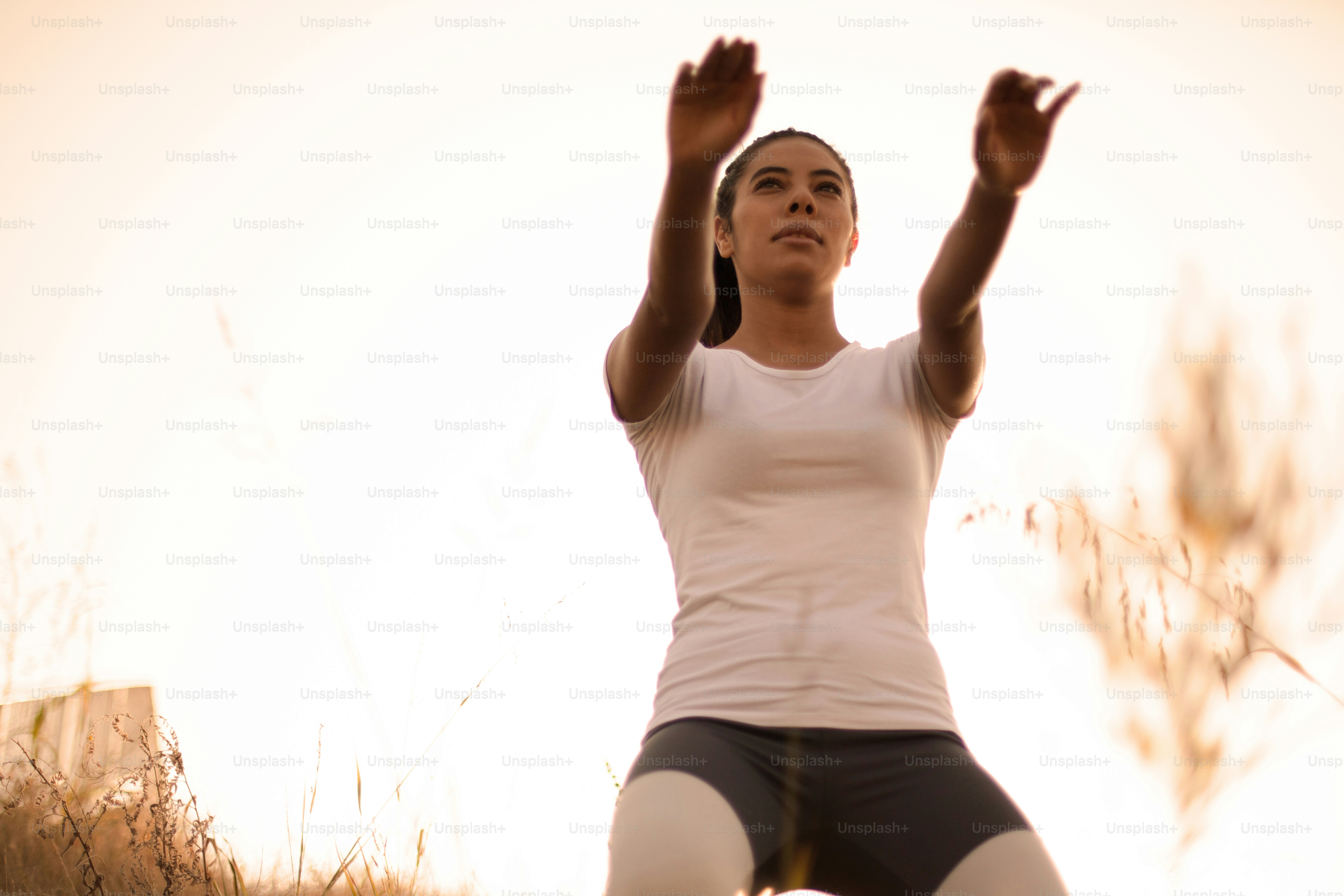 Woman working squats in nature. photo – Serbia Image on Unsplash