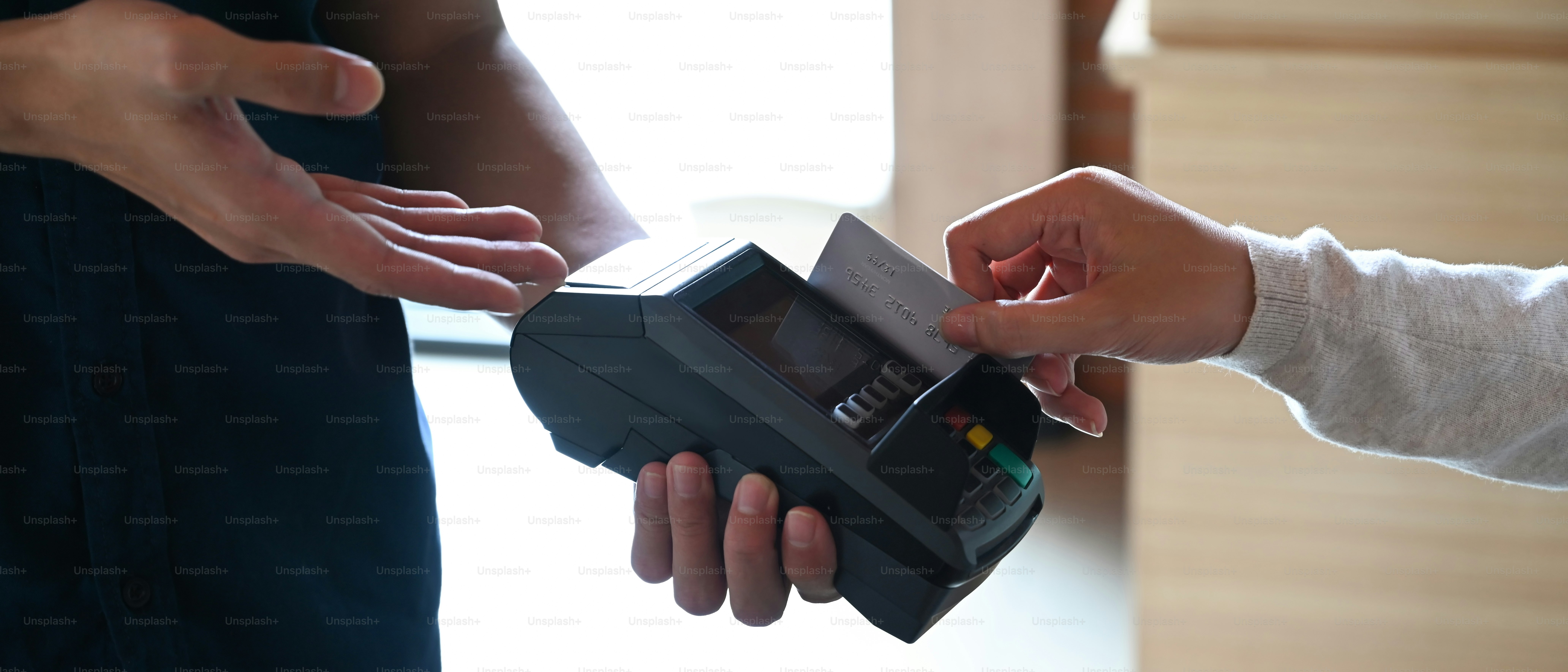 Woman paying with credit card in "nrestaurant. photo – Consumerism ...