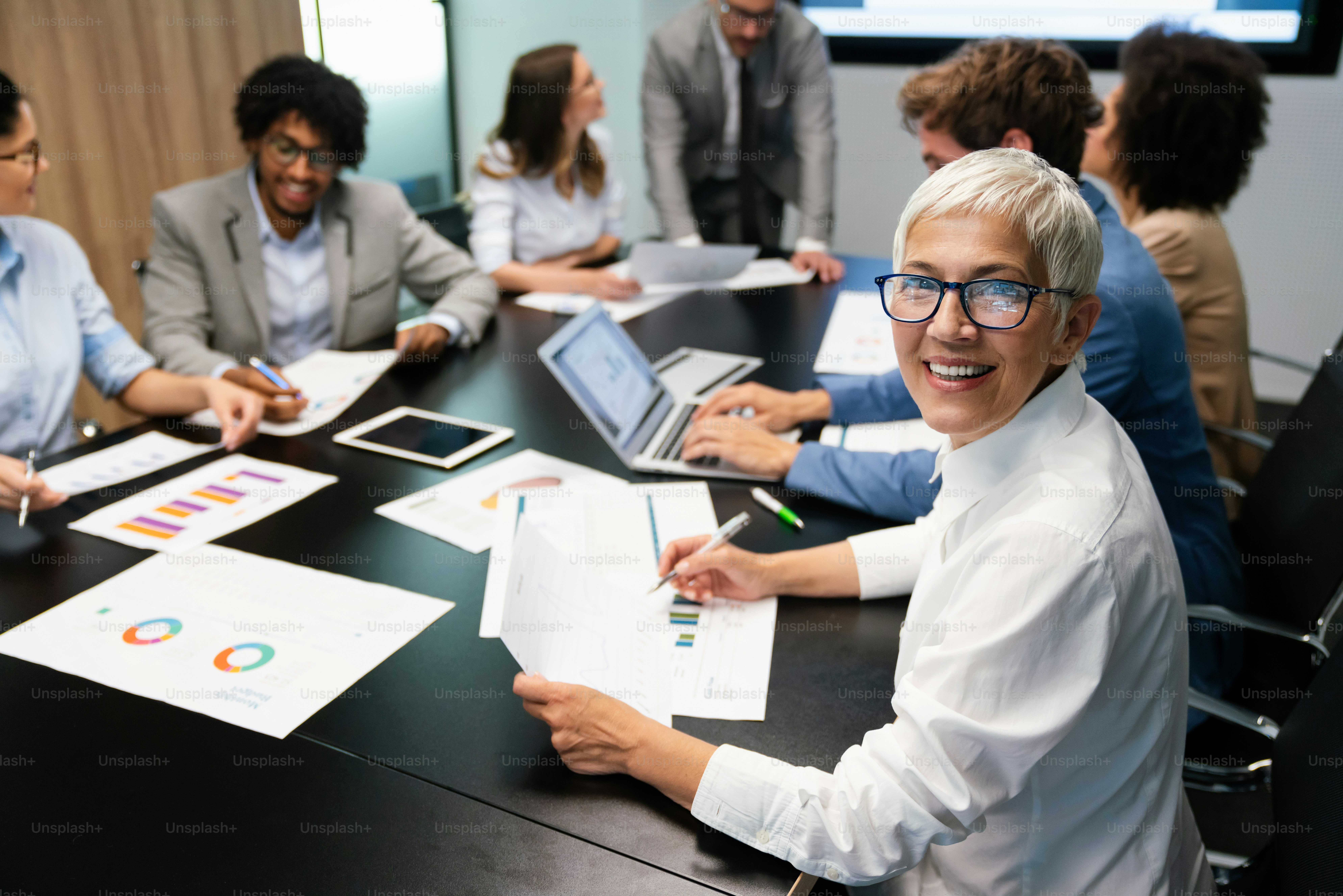 Group of diverse business people working at busy modern office photo ...