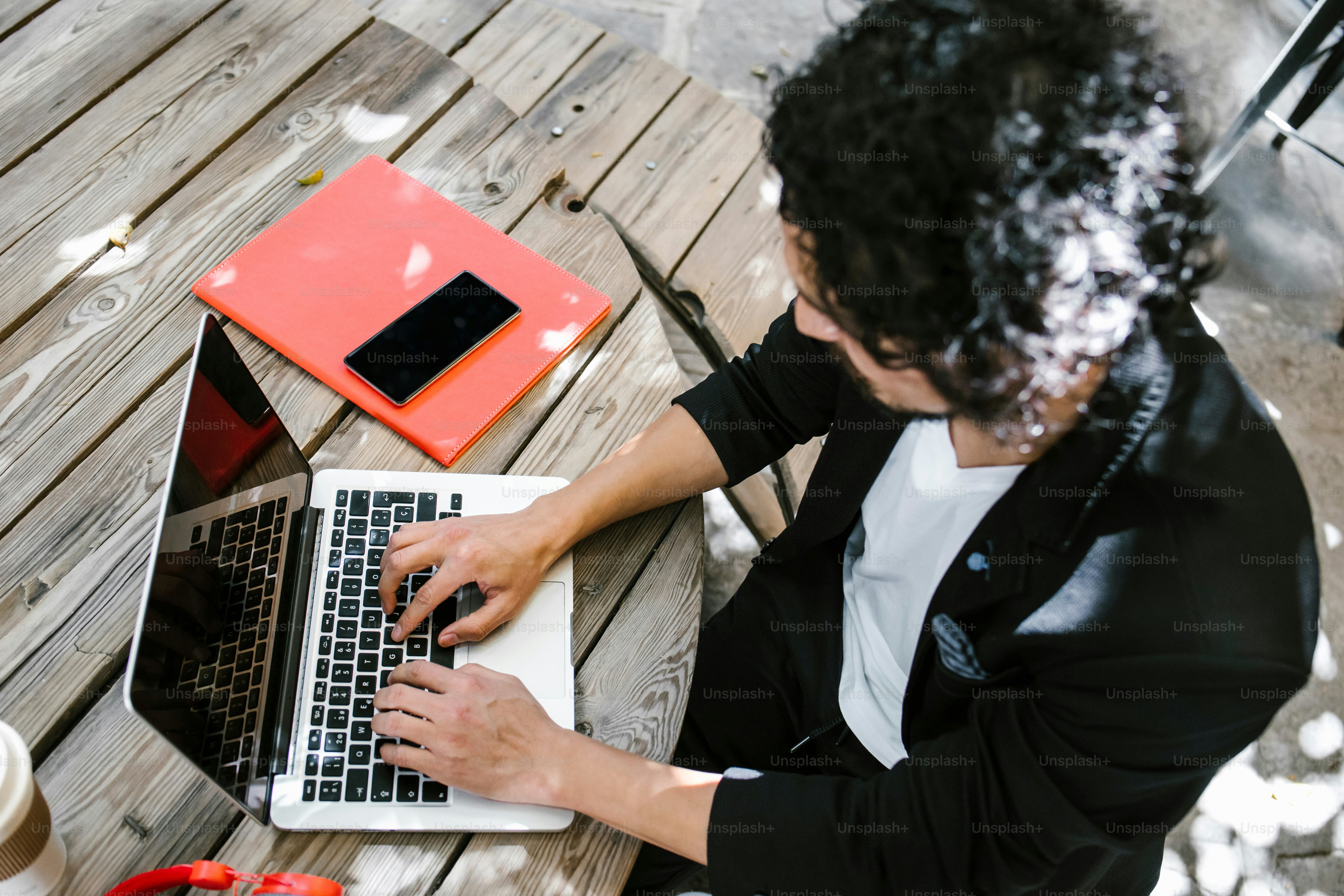 Latin man hands working with computer top view in Latin America photo ...