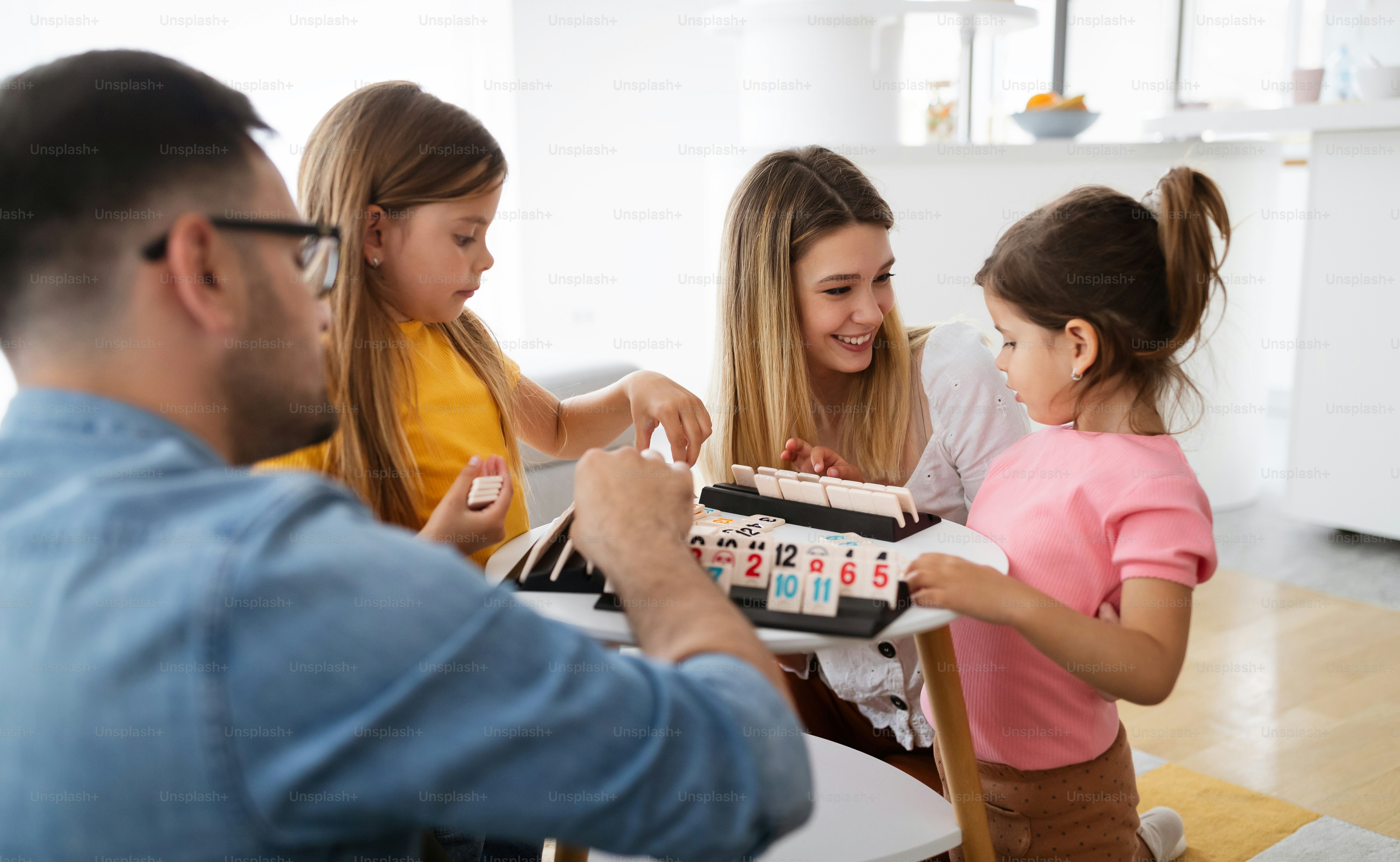 Happy family having fun, spending time together at home photo – Joy ...