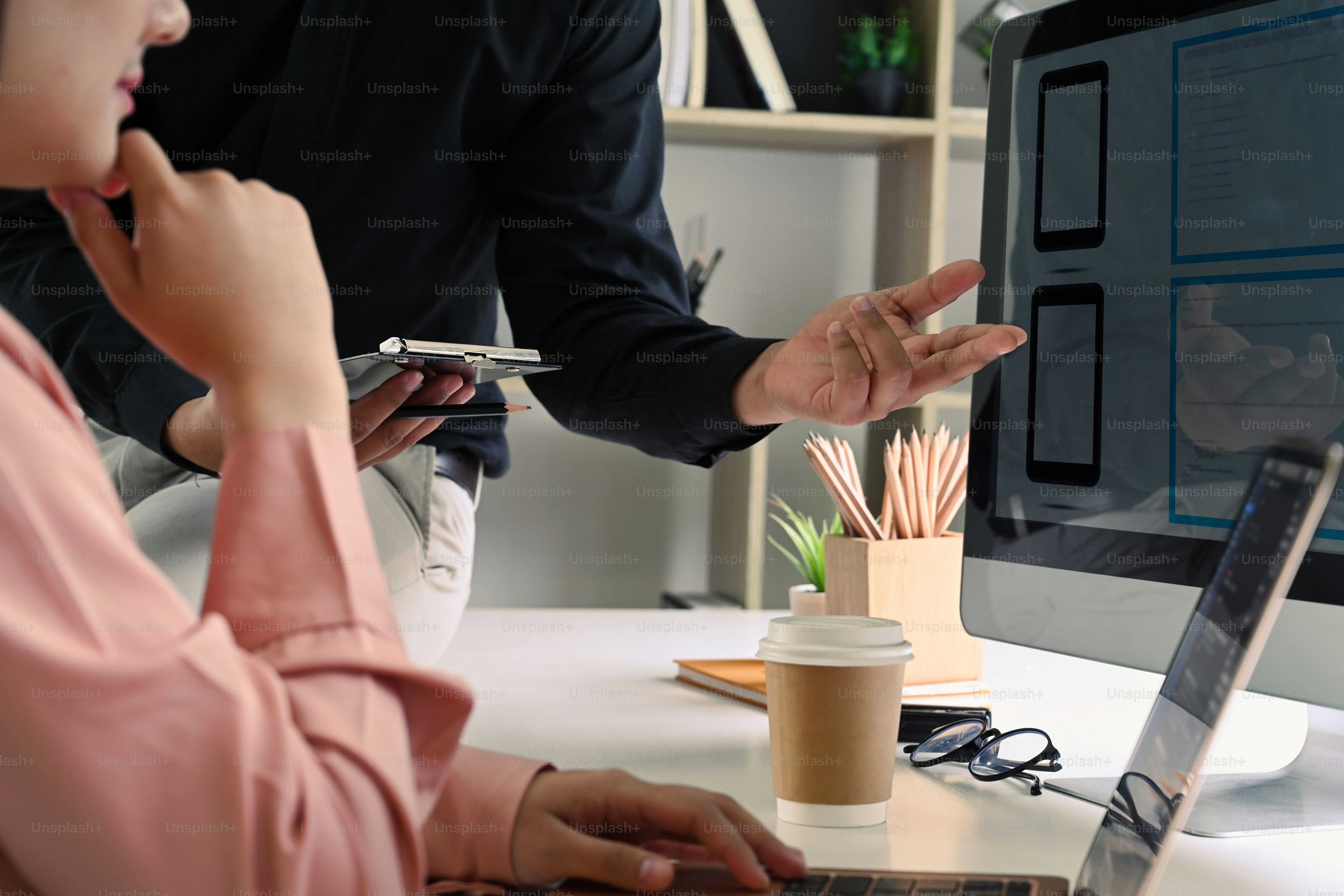 Website development team working together in modern office. photo ...