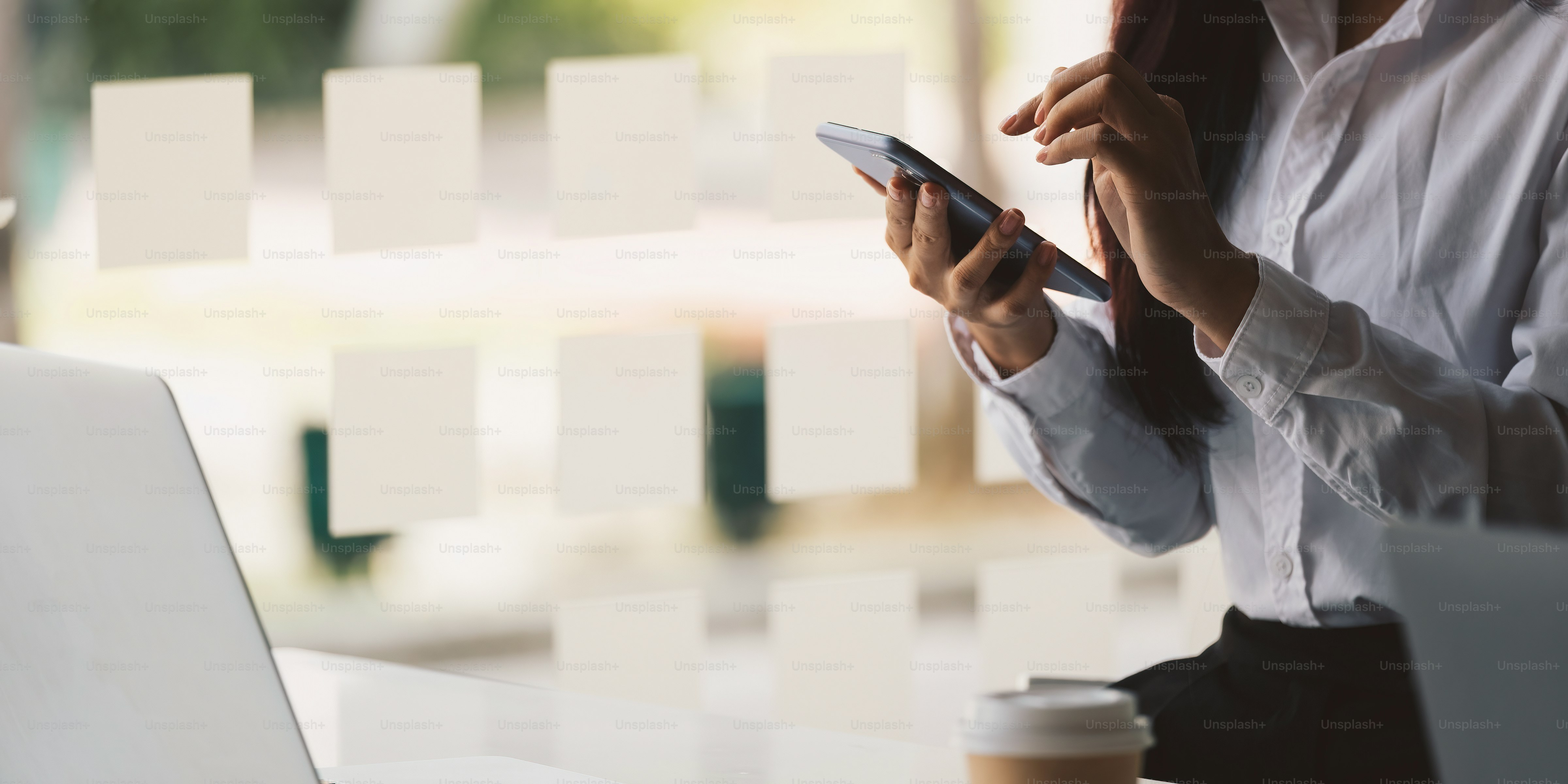 Shot of woman using smart phone at home office. photo – Thailand Image ...