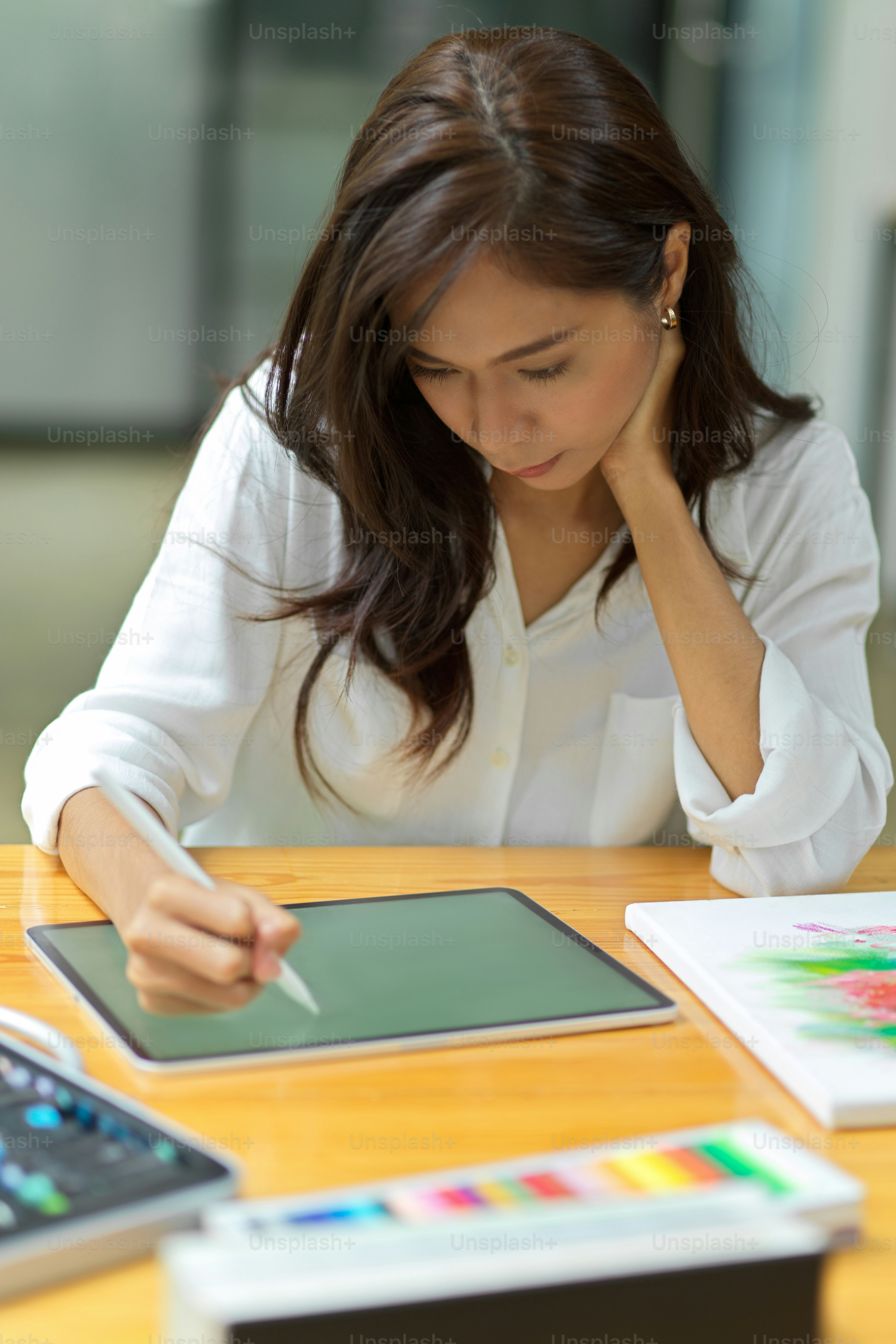 Female Graphic Designer At Work