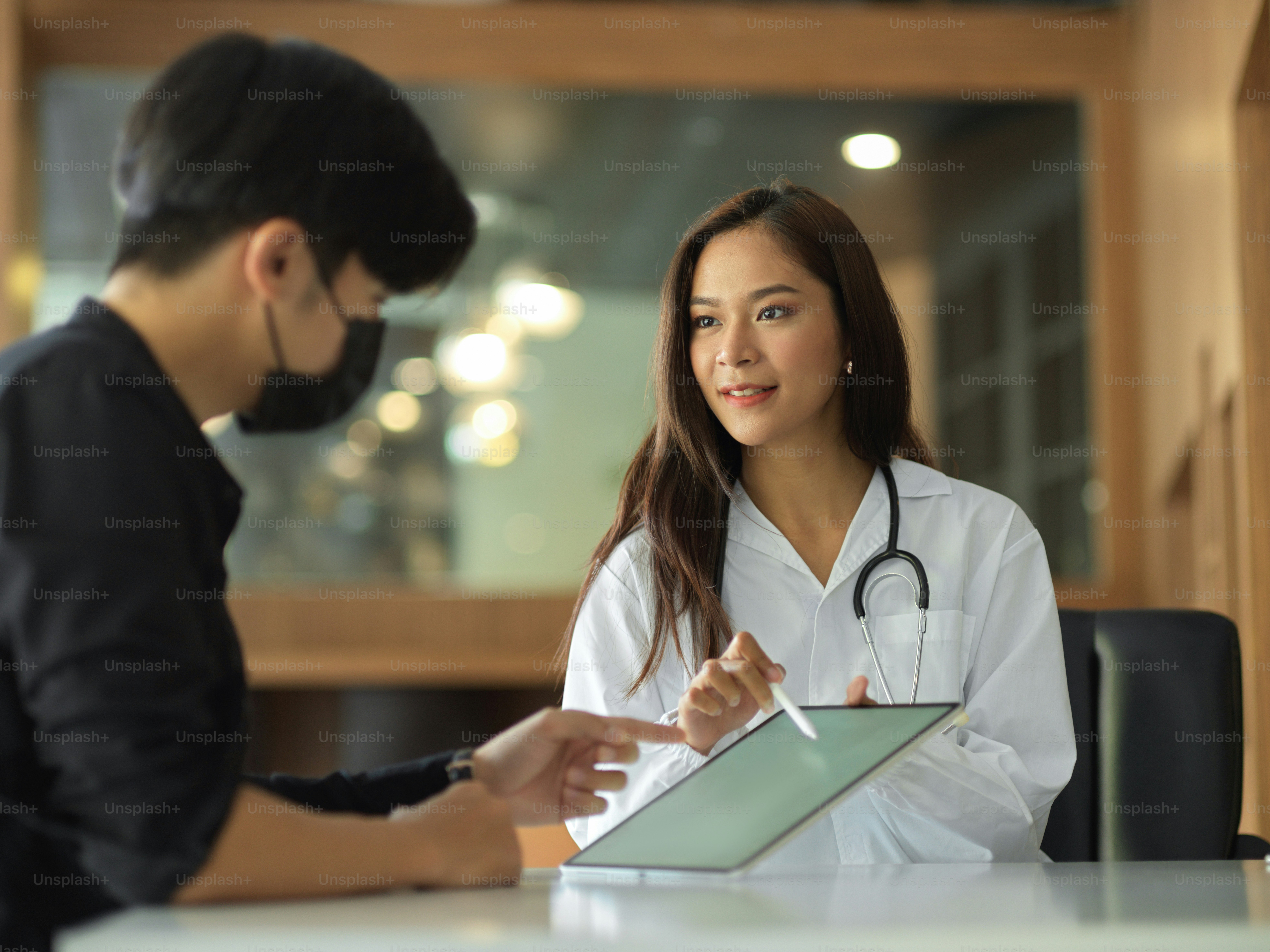 Cheerful Female doctor or practitioner follow up, check up treatment ...