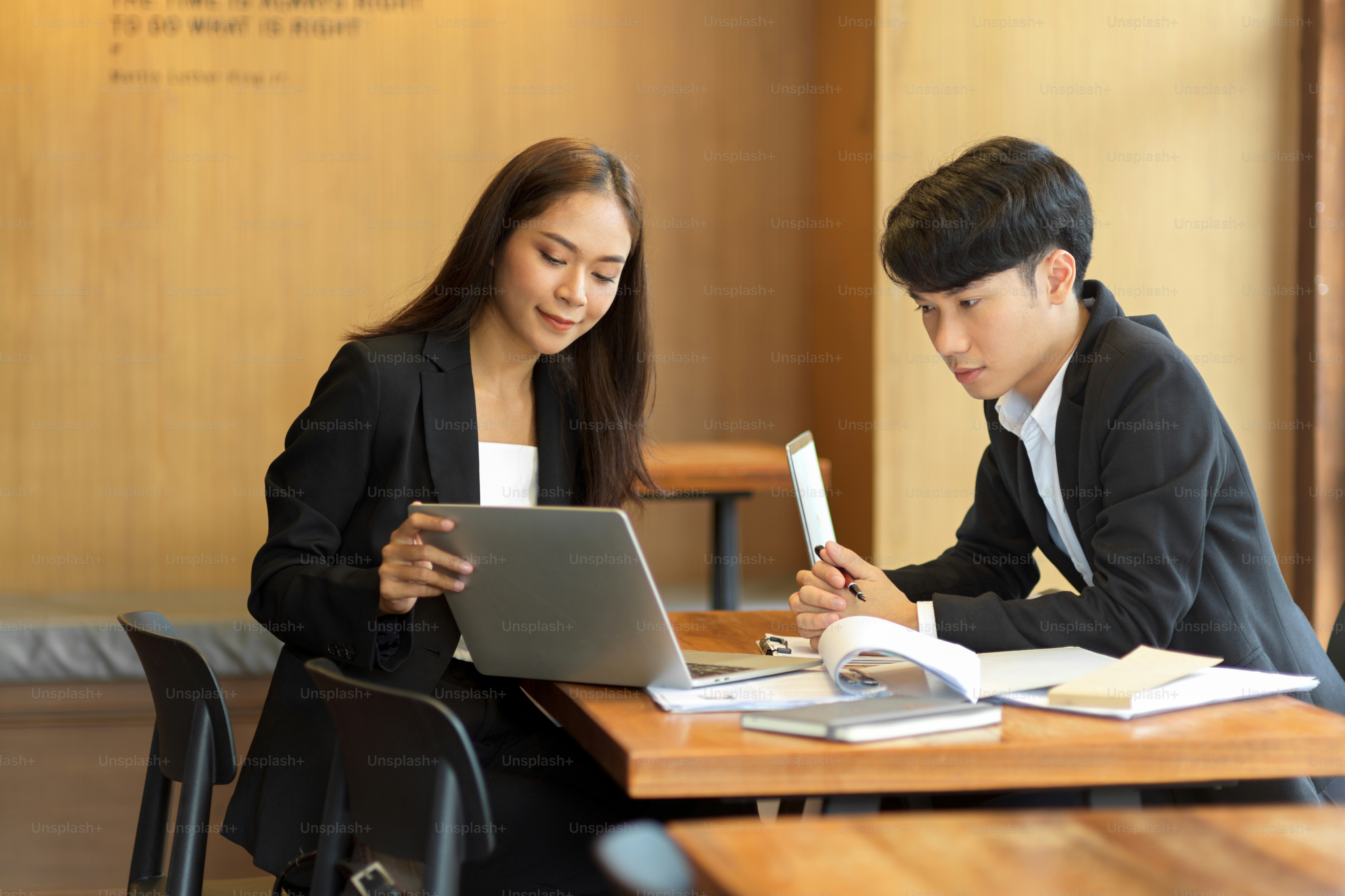 Young businesswoman consulting, giving business instruction, presenting ...
