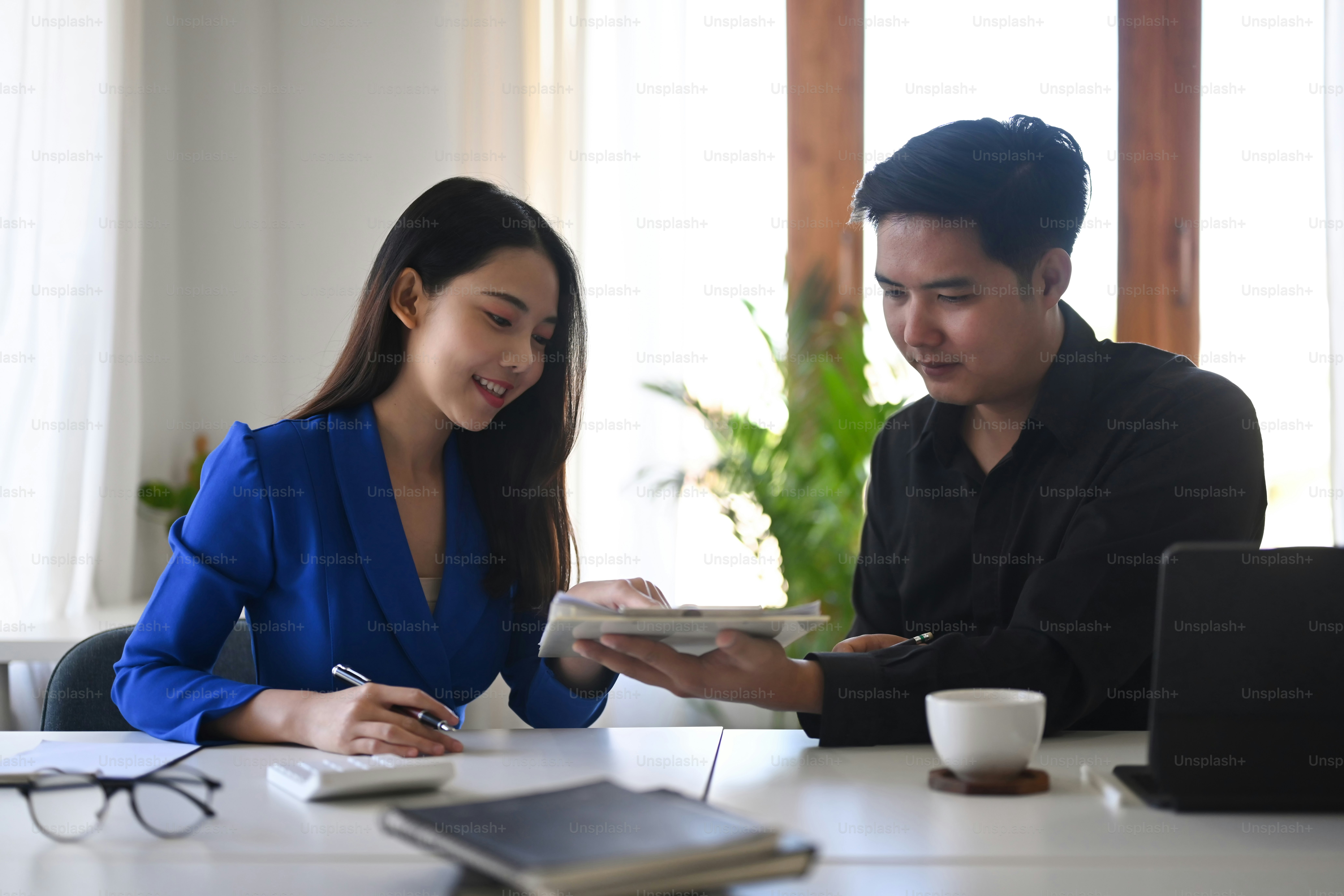 Businesspeople sharing ideas or discussing startup business plan ...