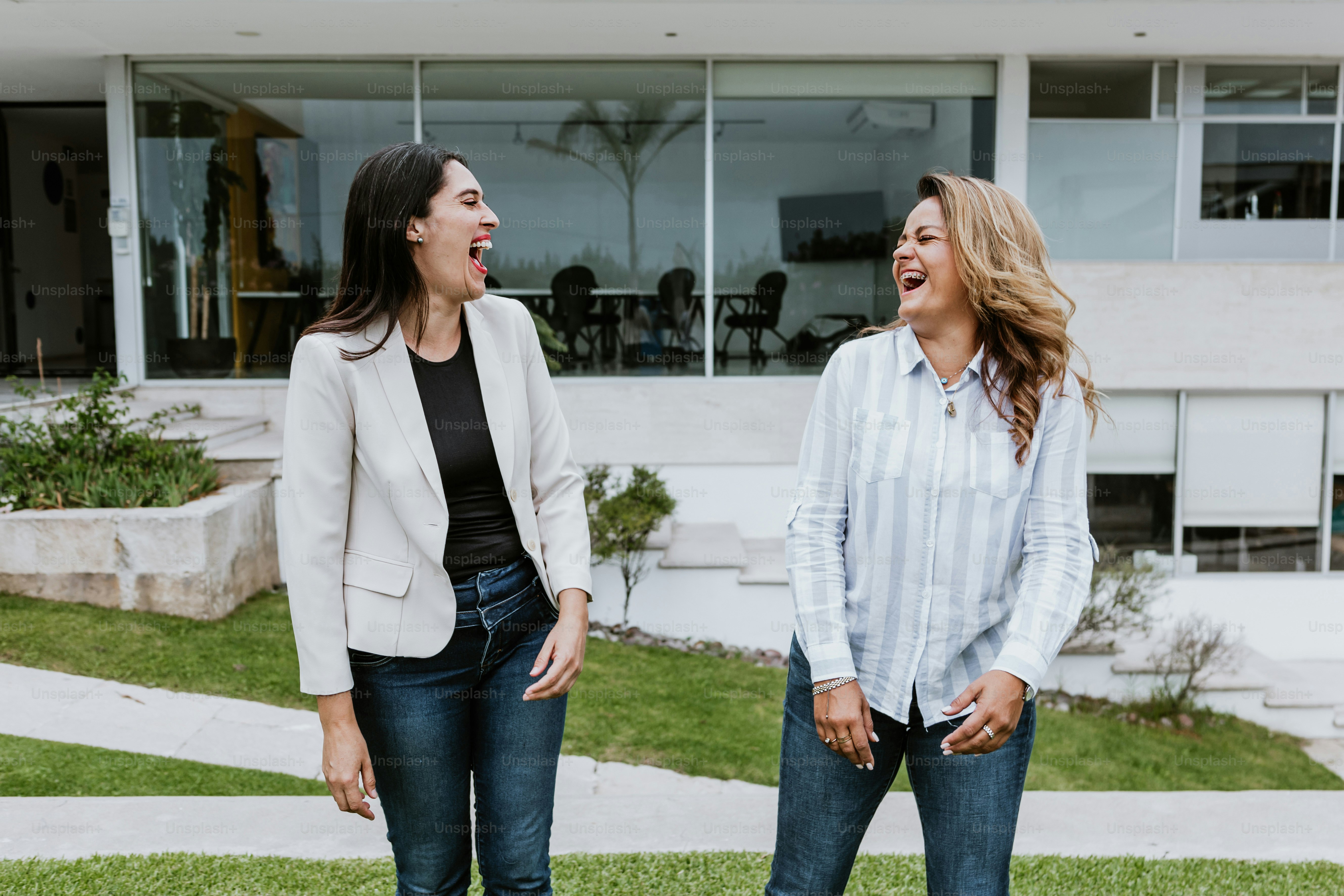 Two latin women friends having fun at terrace office in Mexico Latin ...