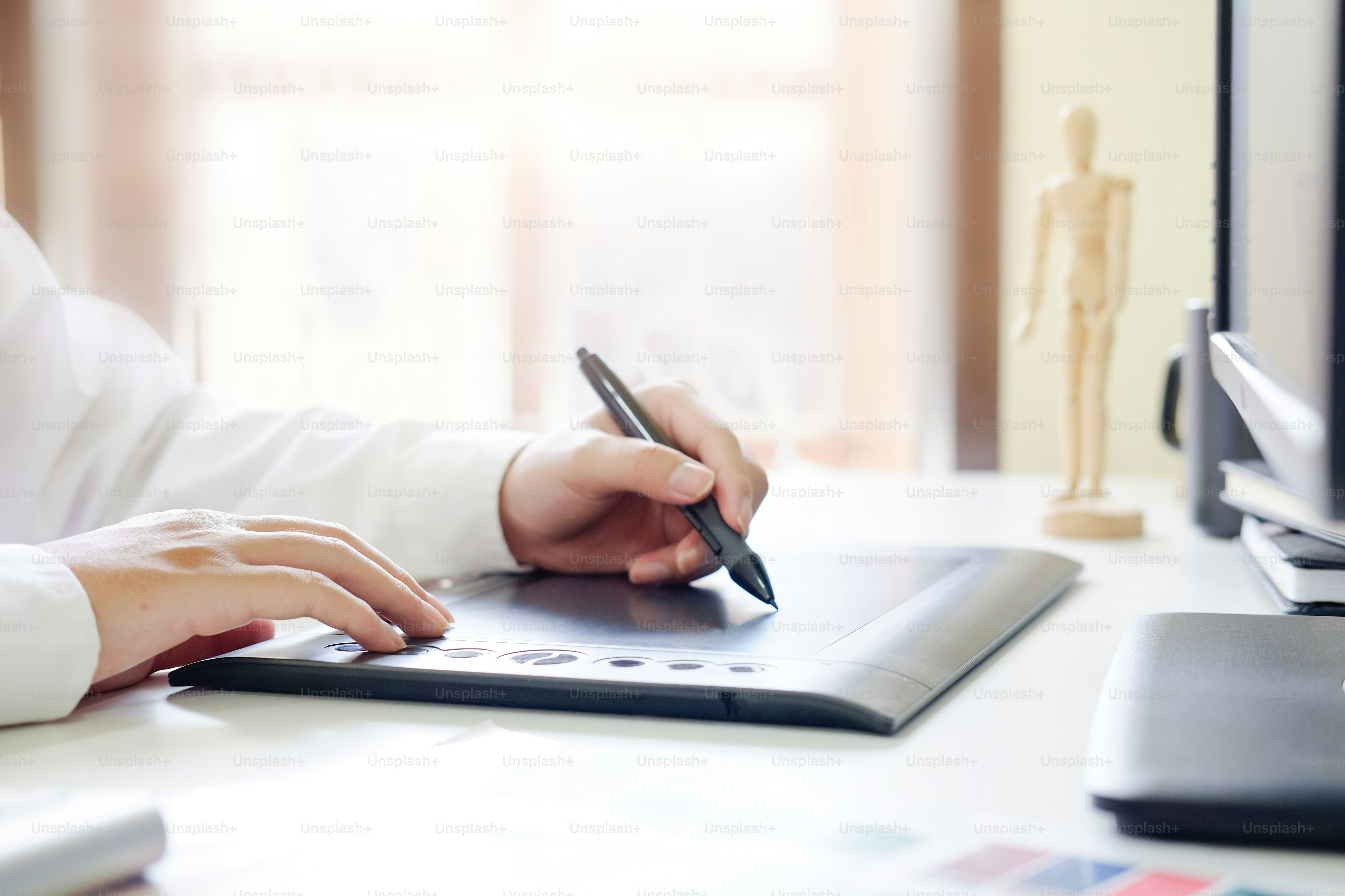 Creative graphic designer working with digital tablet and pen. photo ...