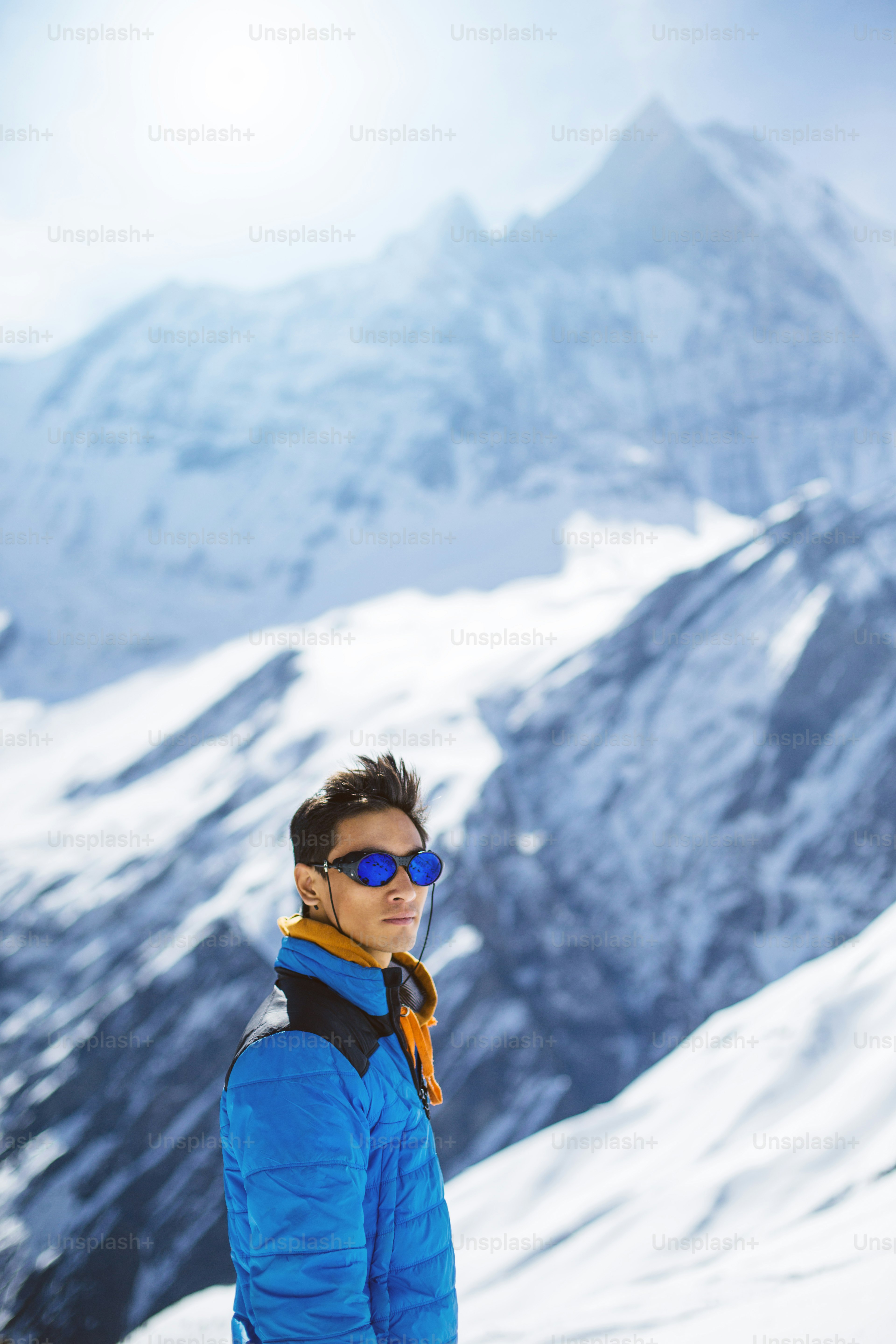 Young Gurkha porter portrait in the Himalaya mountain wilderness of ...