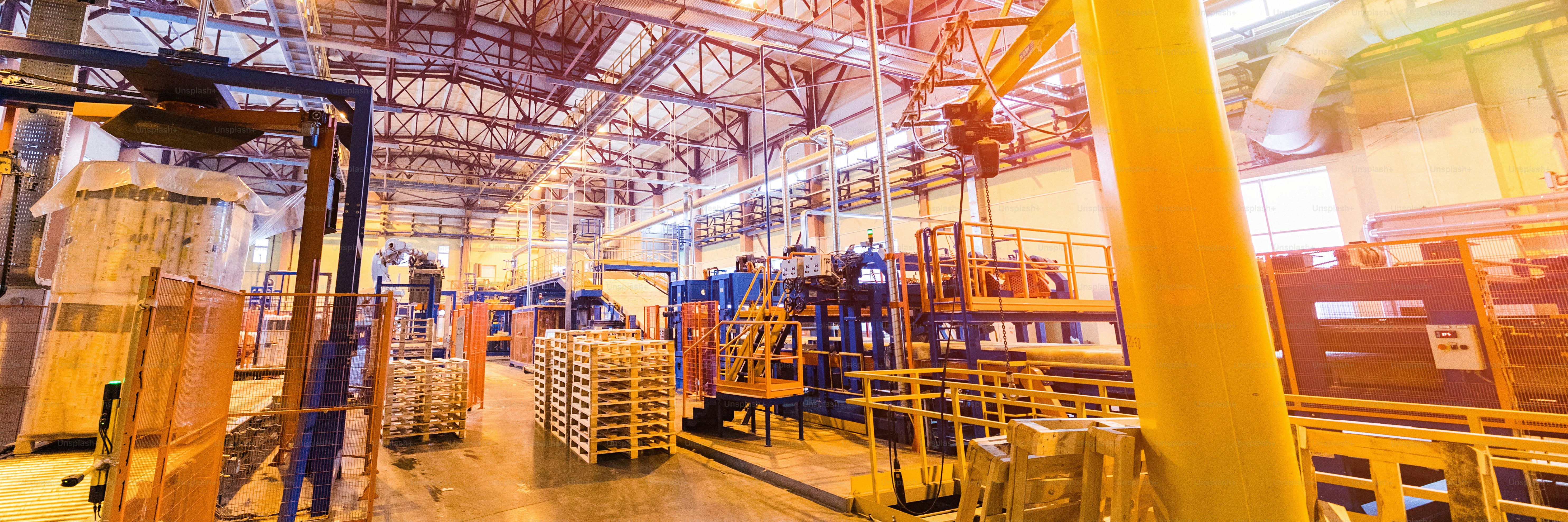 Modern operational plant with stocks of pallets heavy industry ...