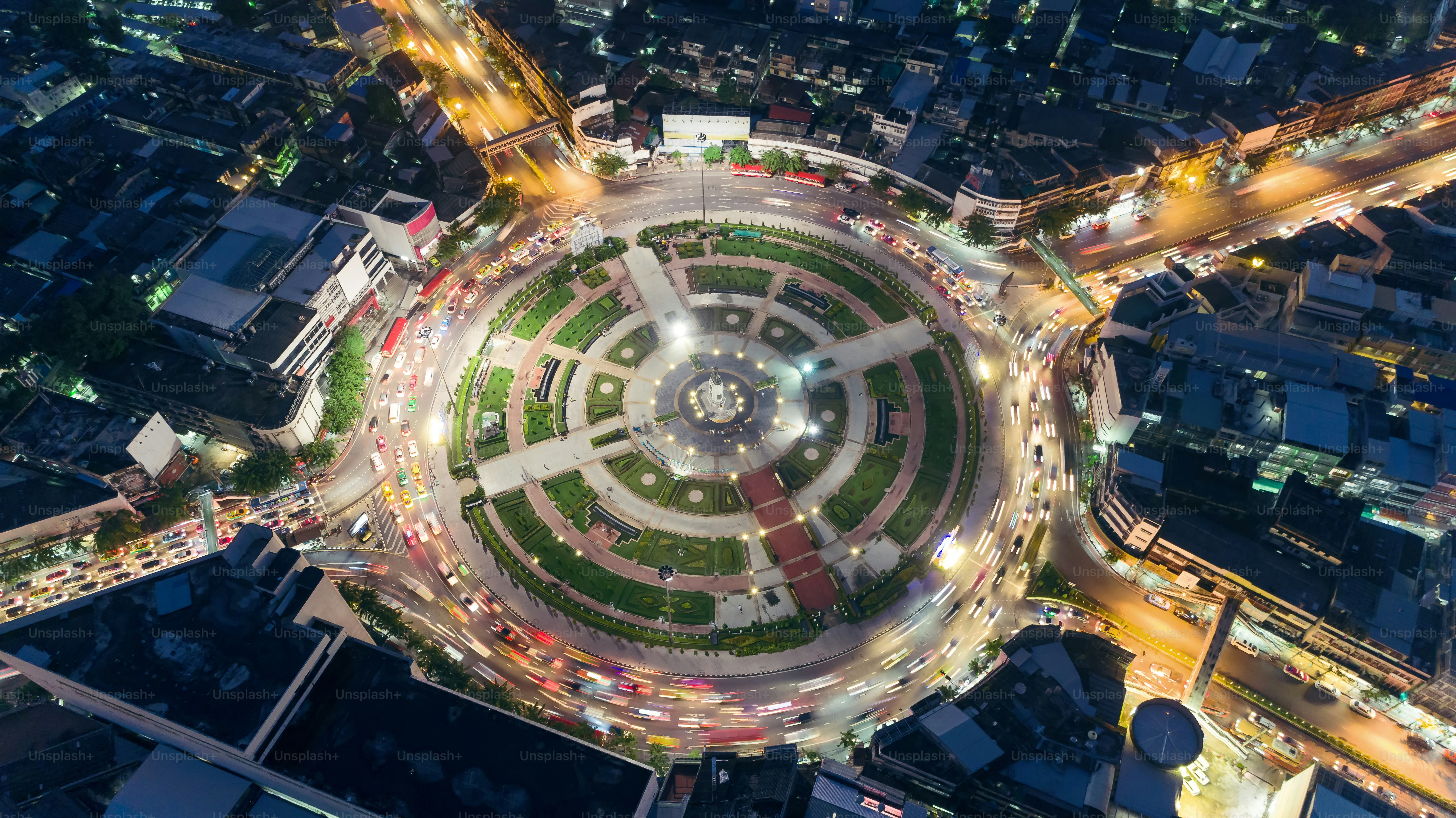 Aerial view highway road intersection roundabout or circle at night for ...