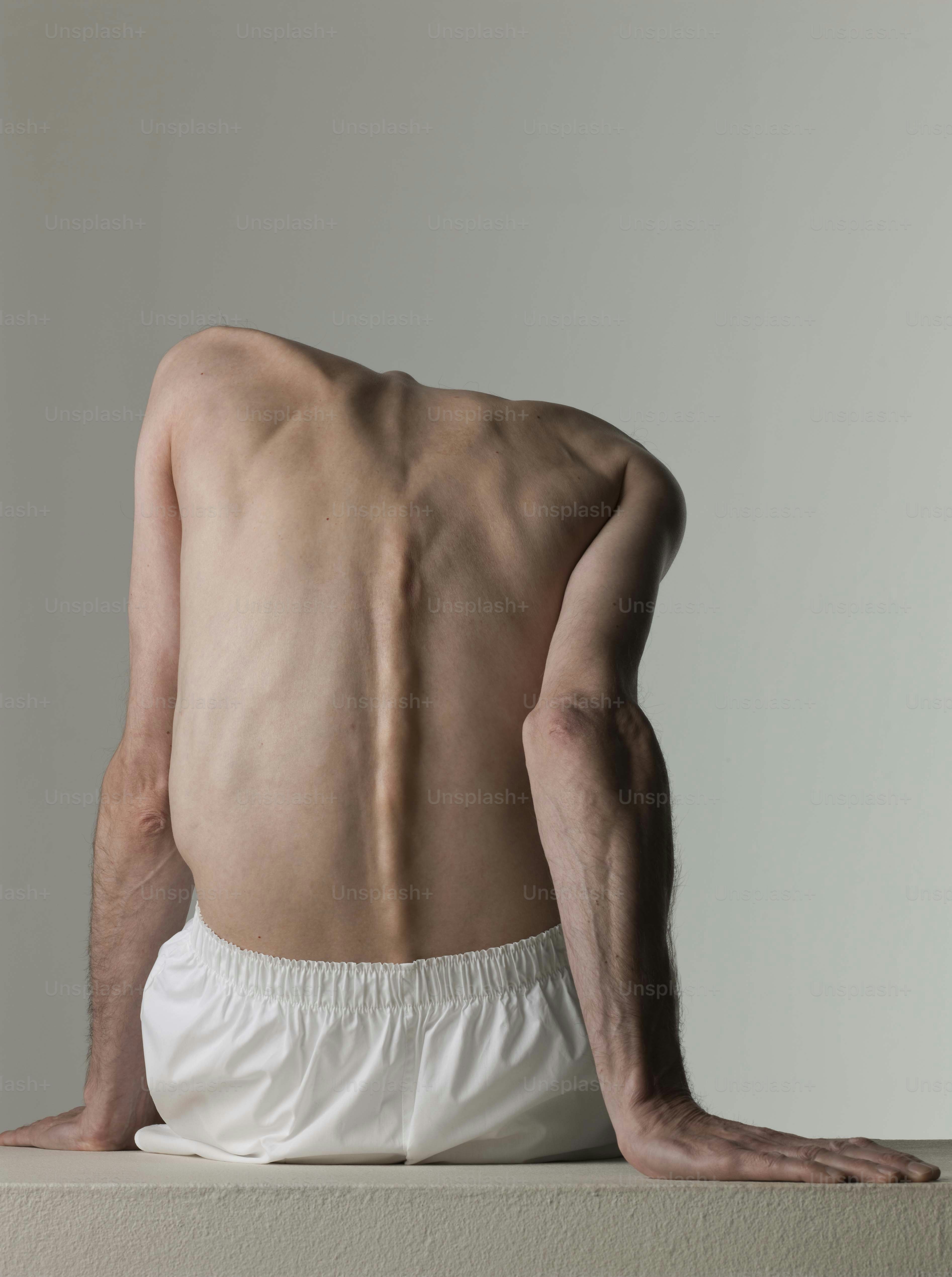 A man without a shirt posing for a picture photo – Shirtless Image on ...