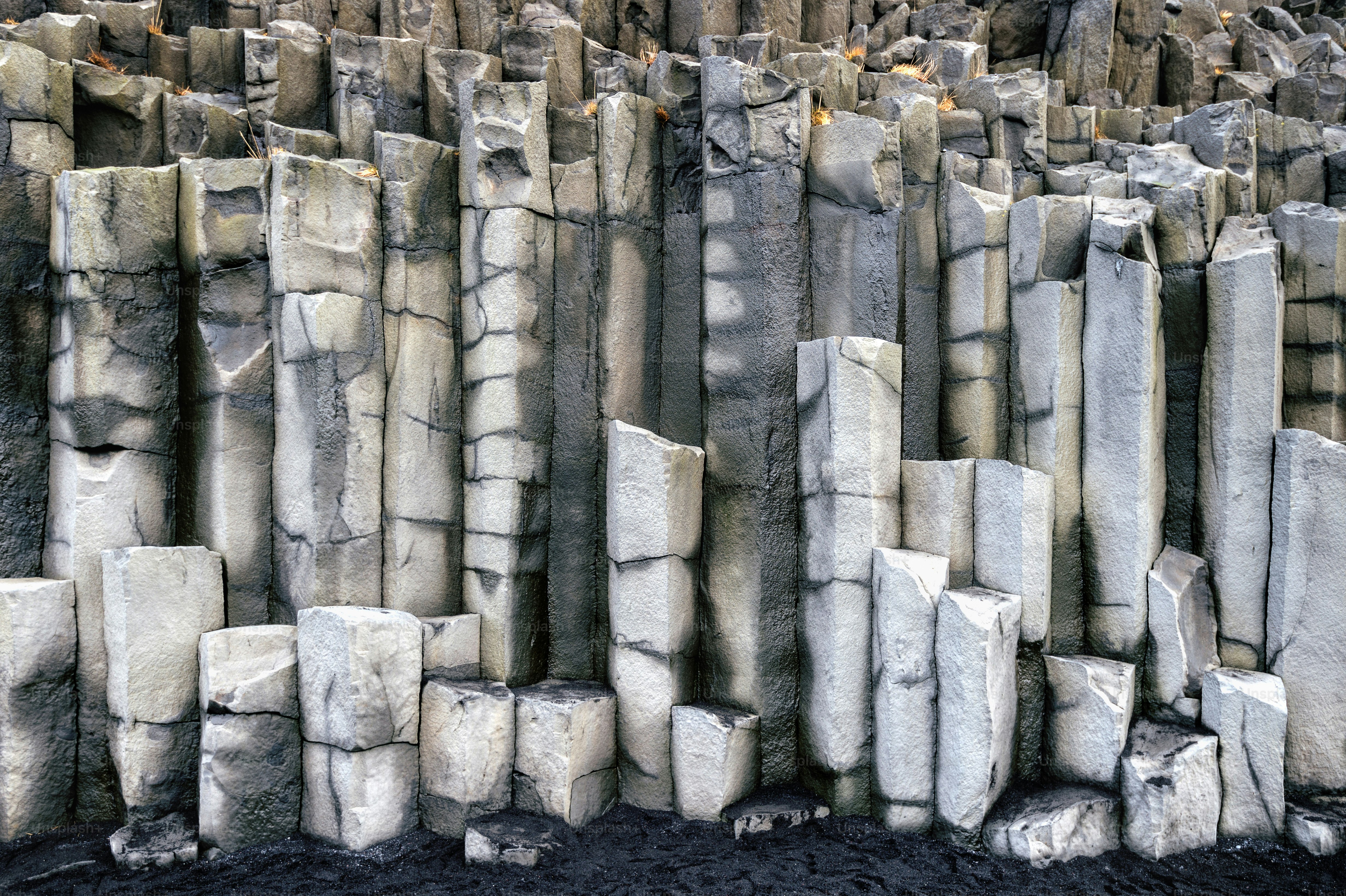 Basalt columns near Vik, Iceland. photo – Geology Image on Unsplash