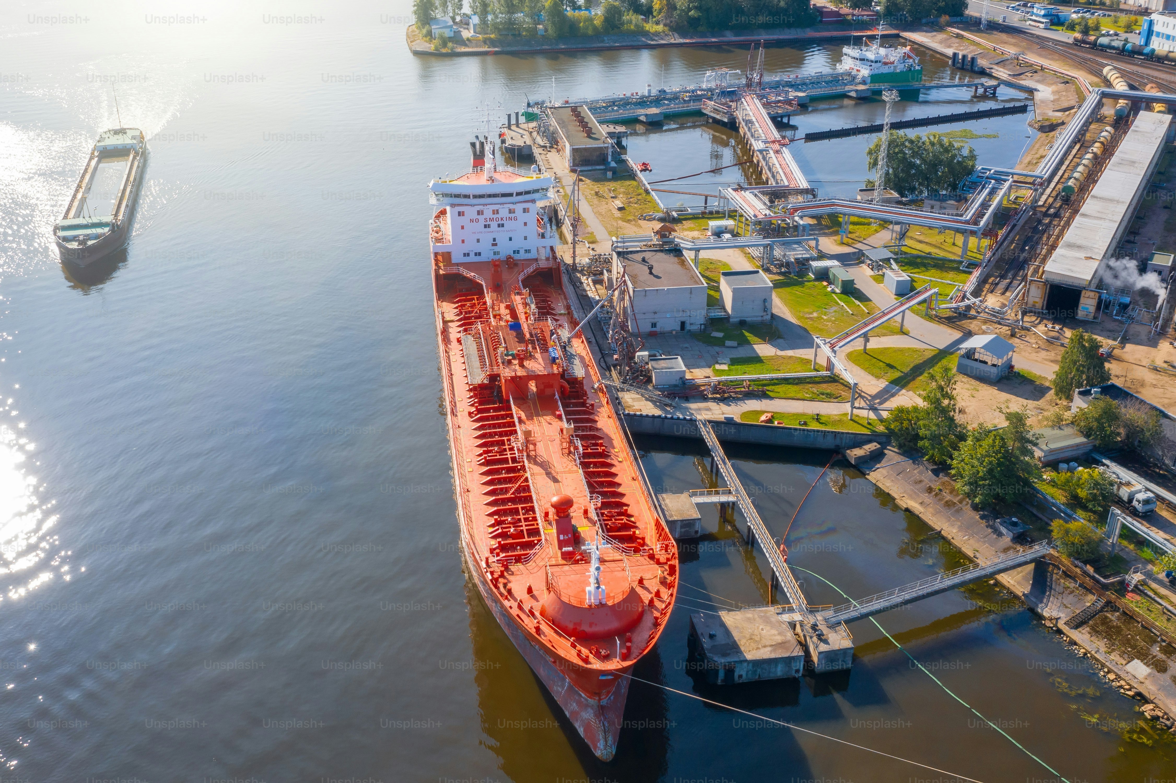 Oil tanker at the pier in the bulk port, the concept of transportation ...