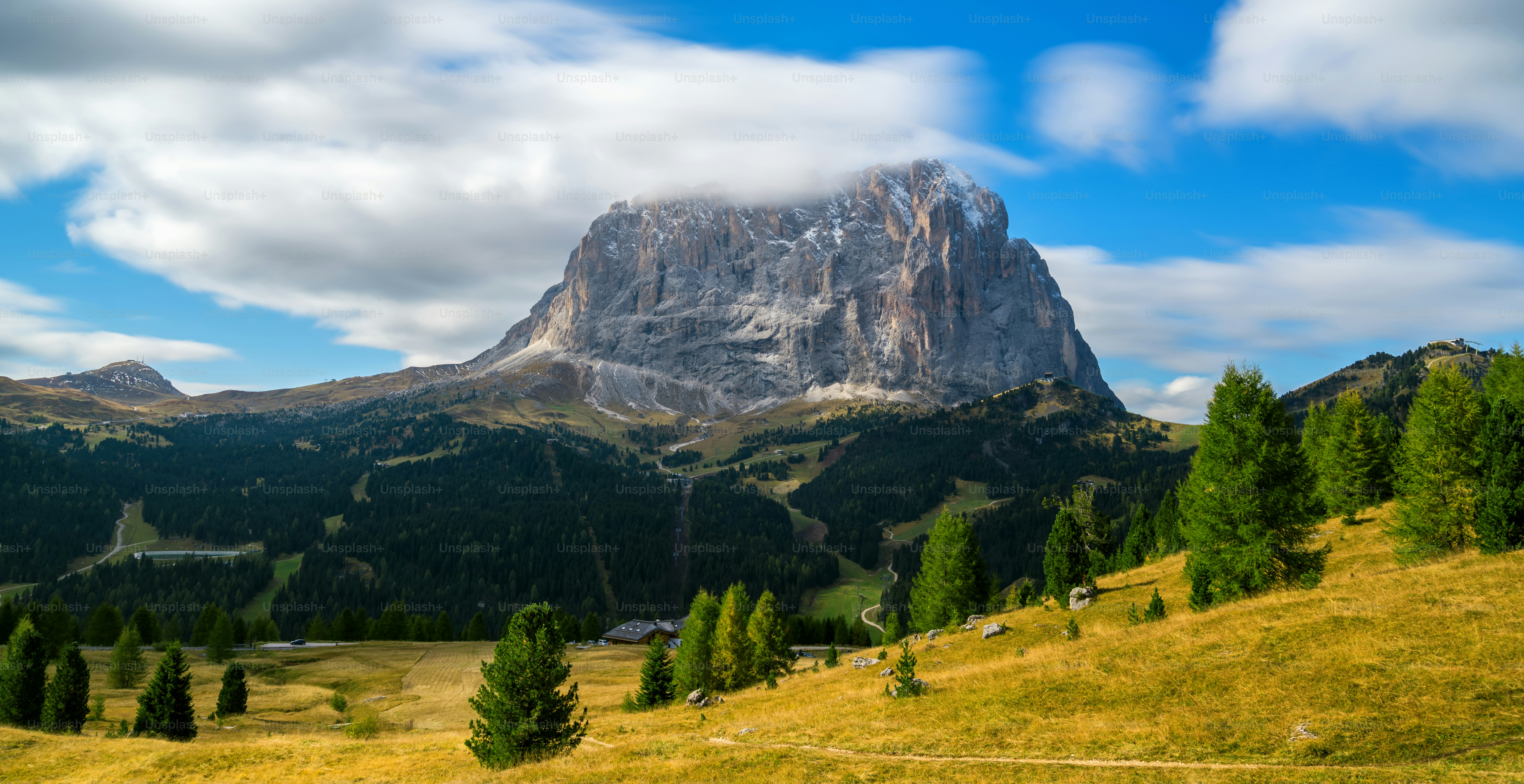 Dolomites Italy Panoramic Landscape. Sunrise shines on Sassolungo ...