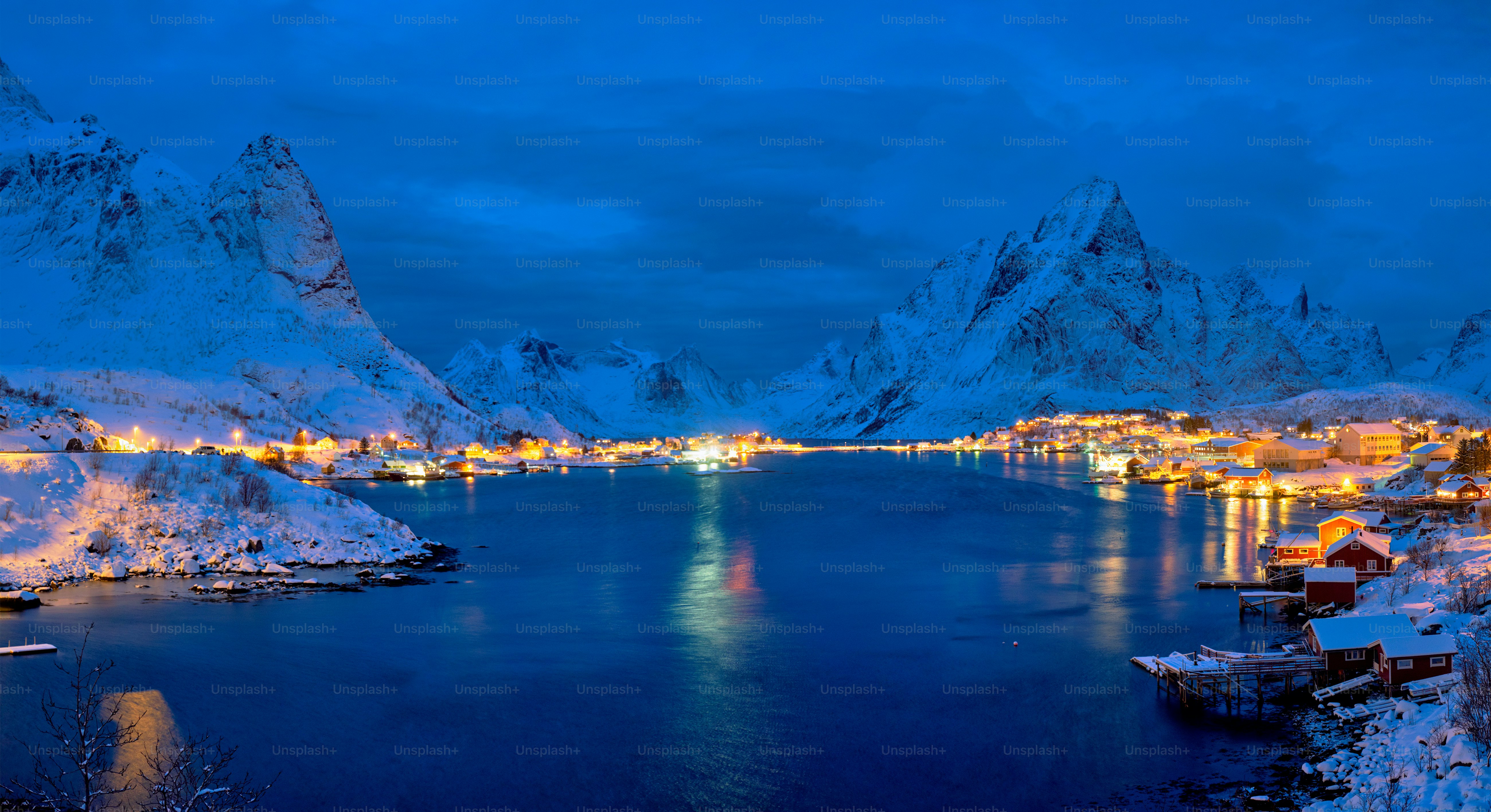 Reine village illuminated at night. Lofoten islands, Norway photo ...