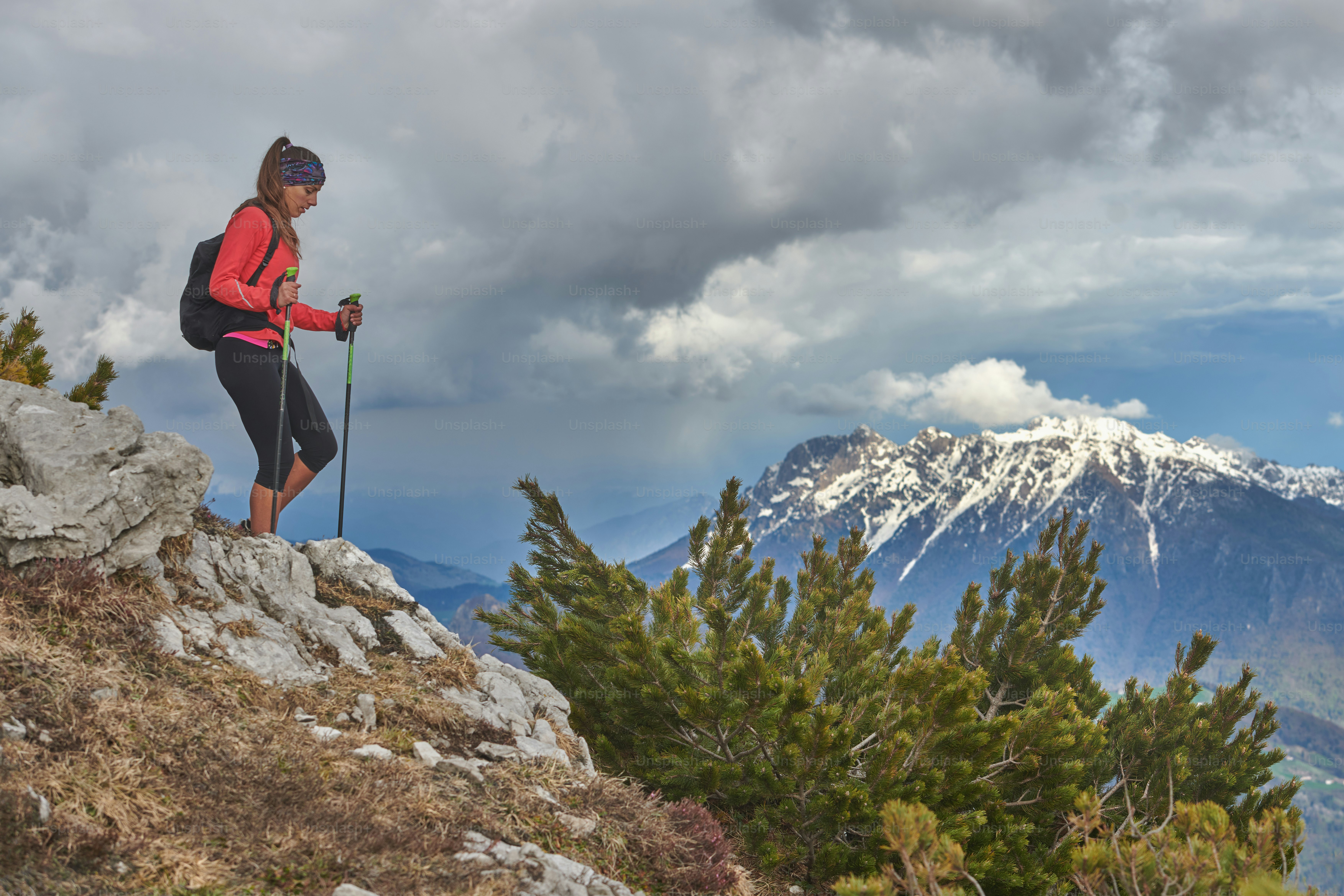 Descent girl during an alpine trekking on the Alps photo – Nature Image ...