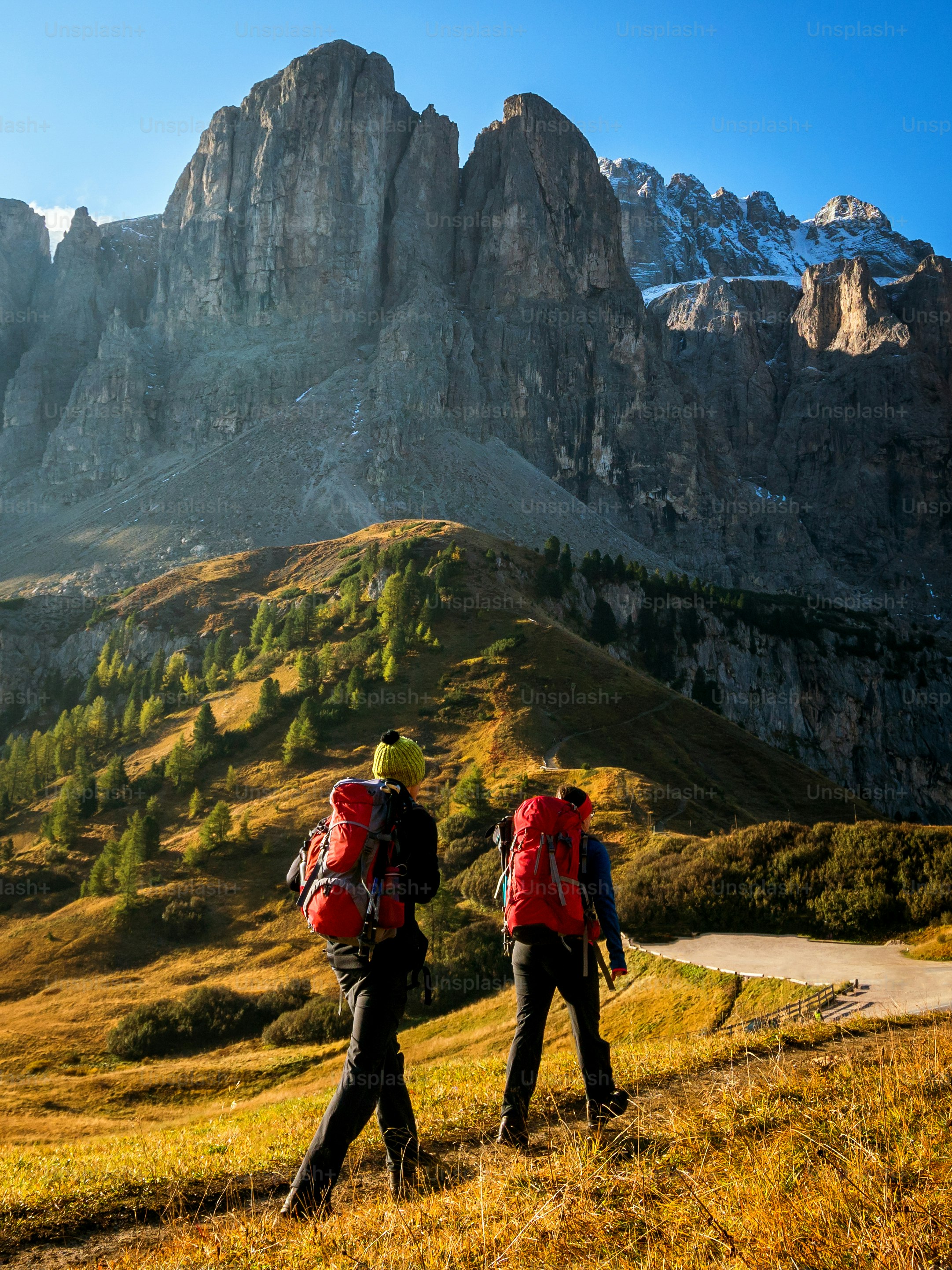 Travelers hiking in breathtaking landscape of Dolomites Mounatins in ...