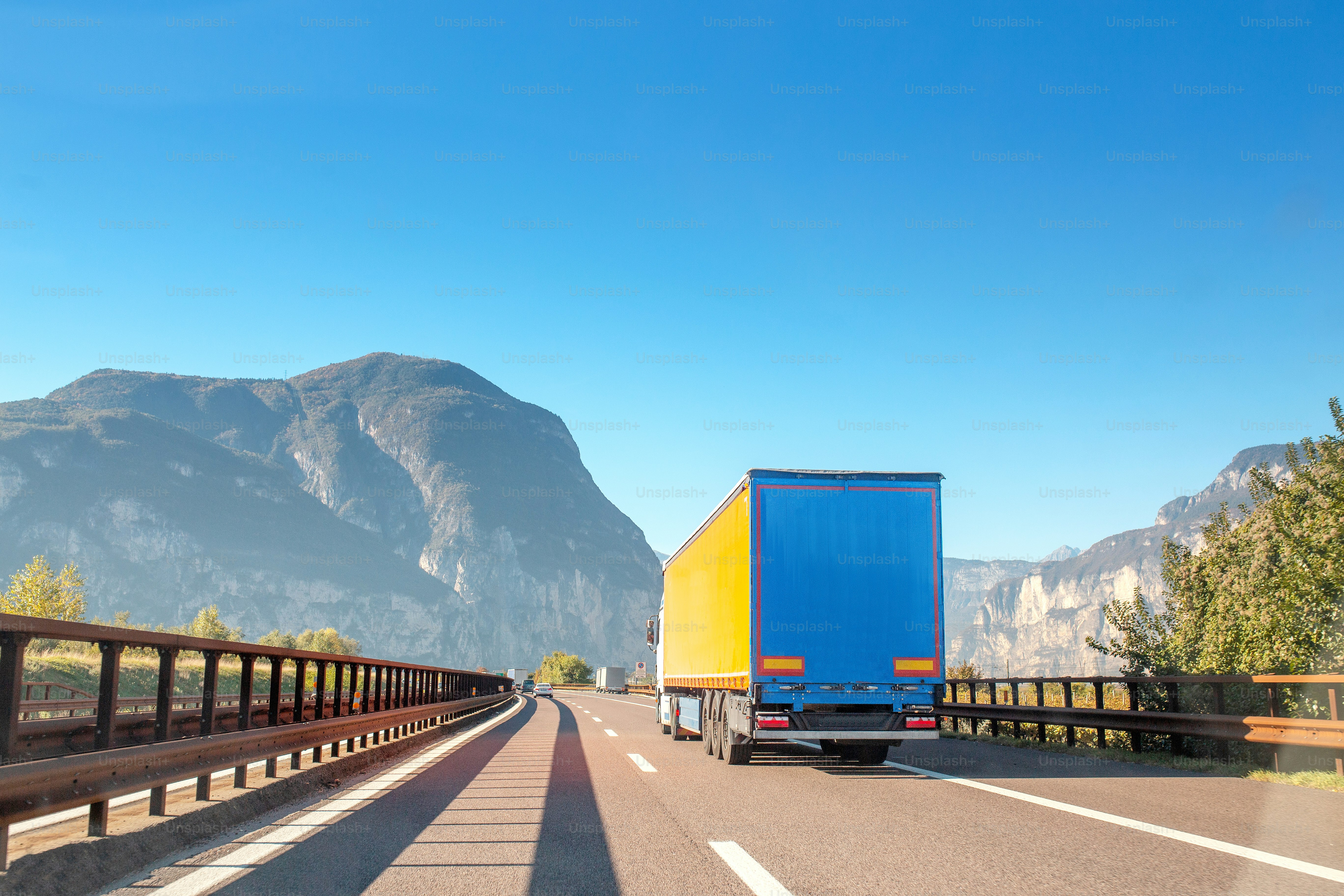 Heavy Cargo truck on the mountain highway photo – Road Image on Unsplash