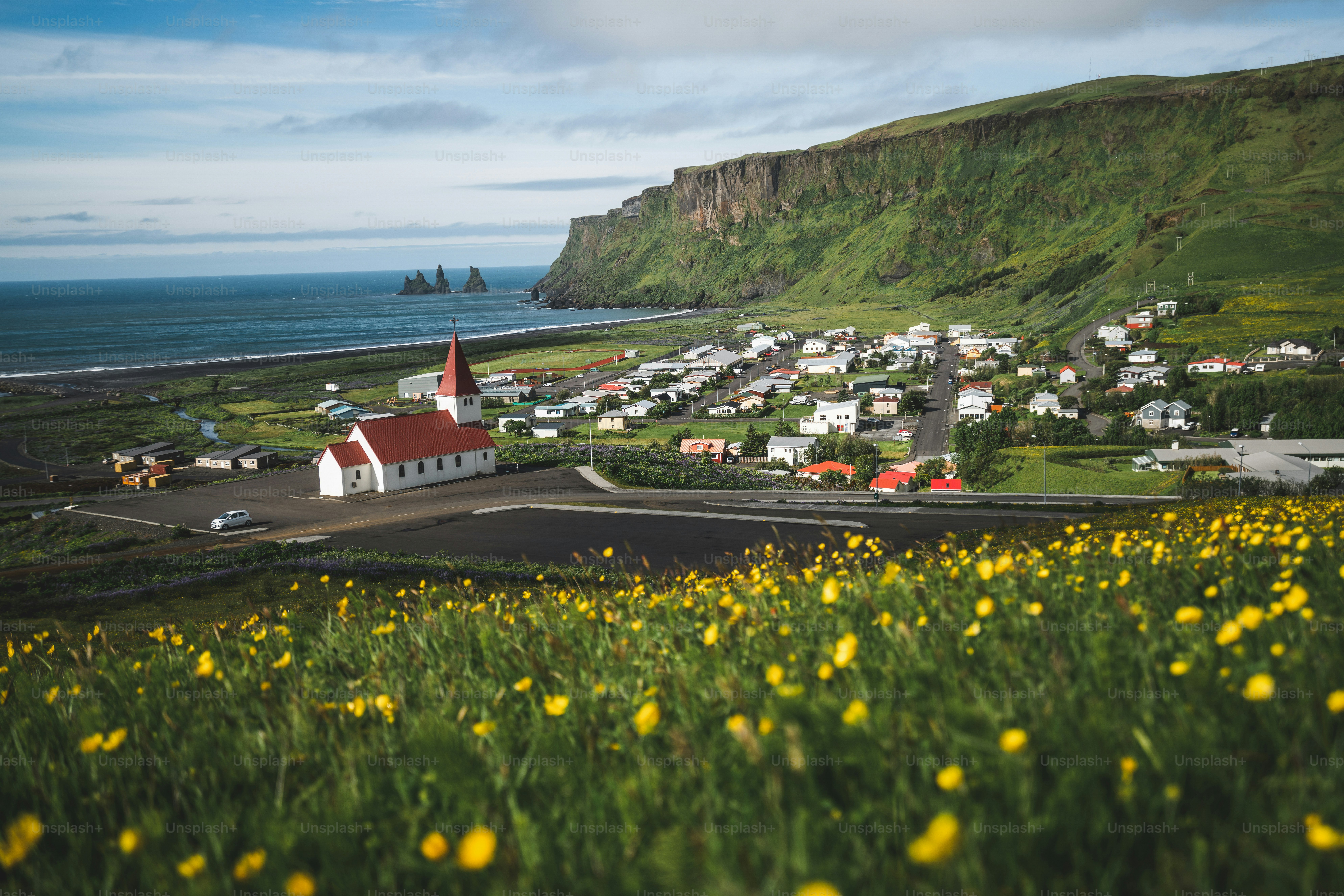 Beautiful town of Vik i Myrdal in Iceland in summer. The village of Vik ...