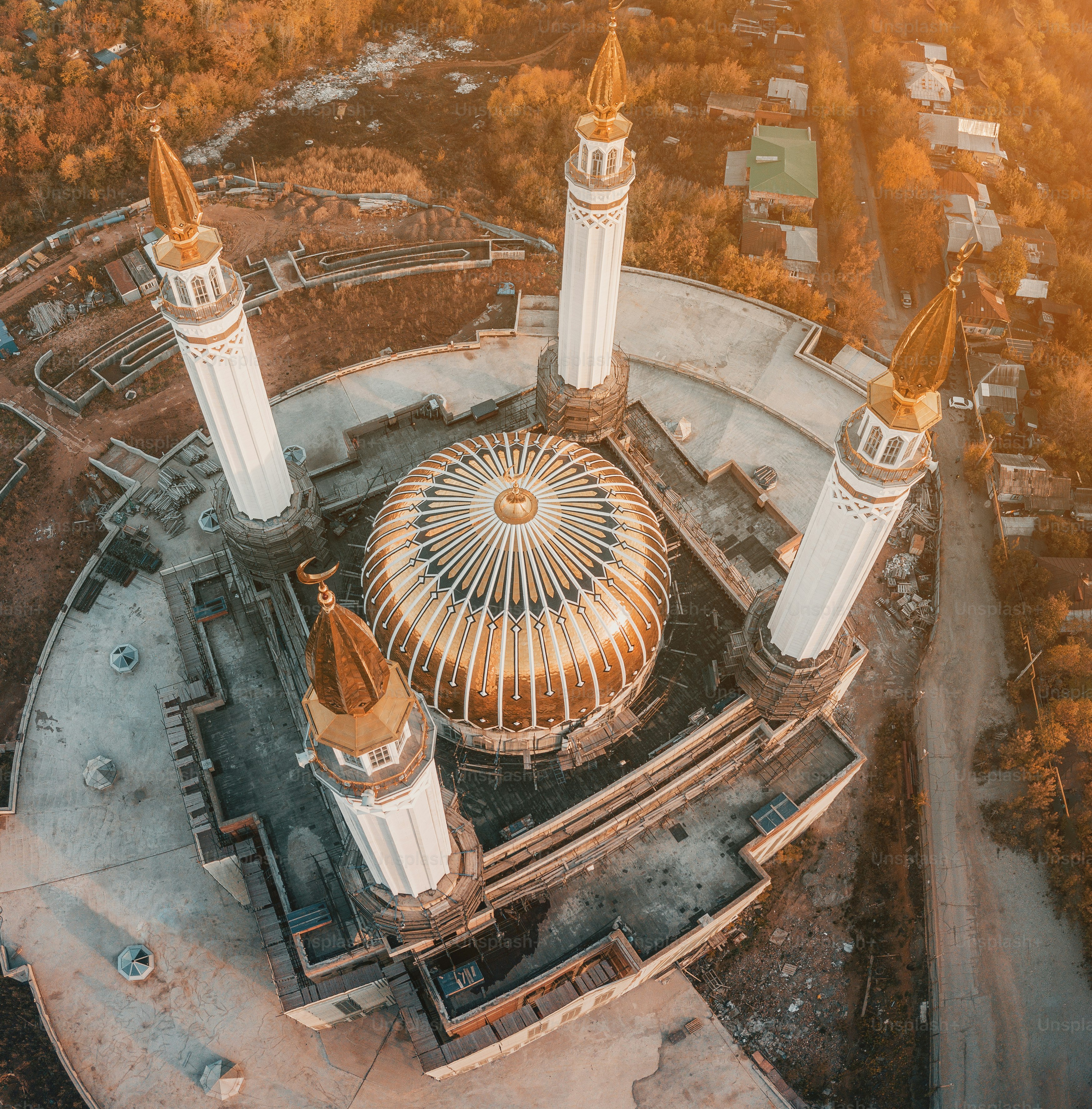 Aerial unusual view of minarets of a majestic mosque. Muslim and ...