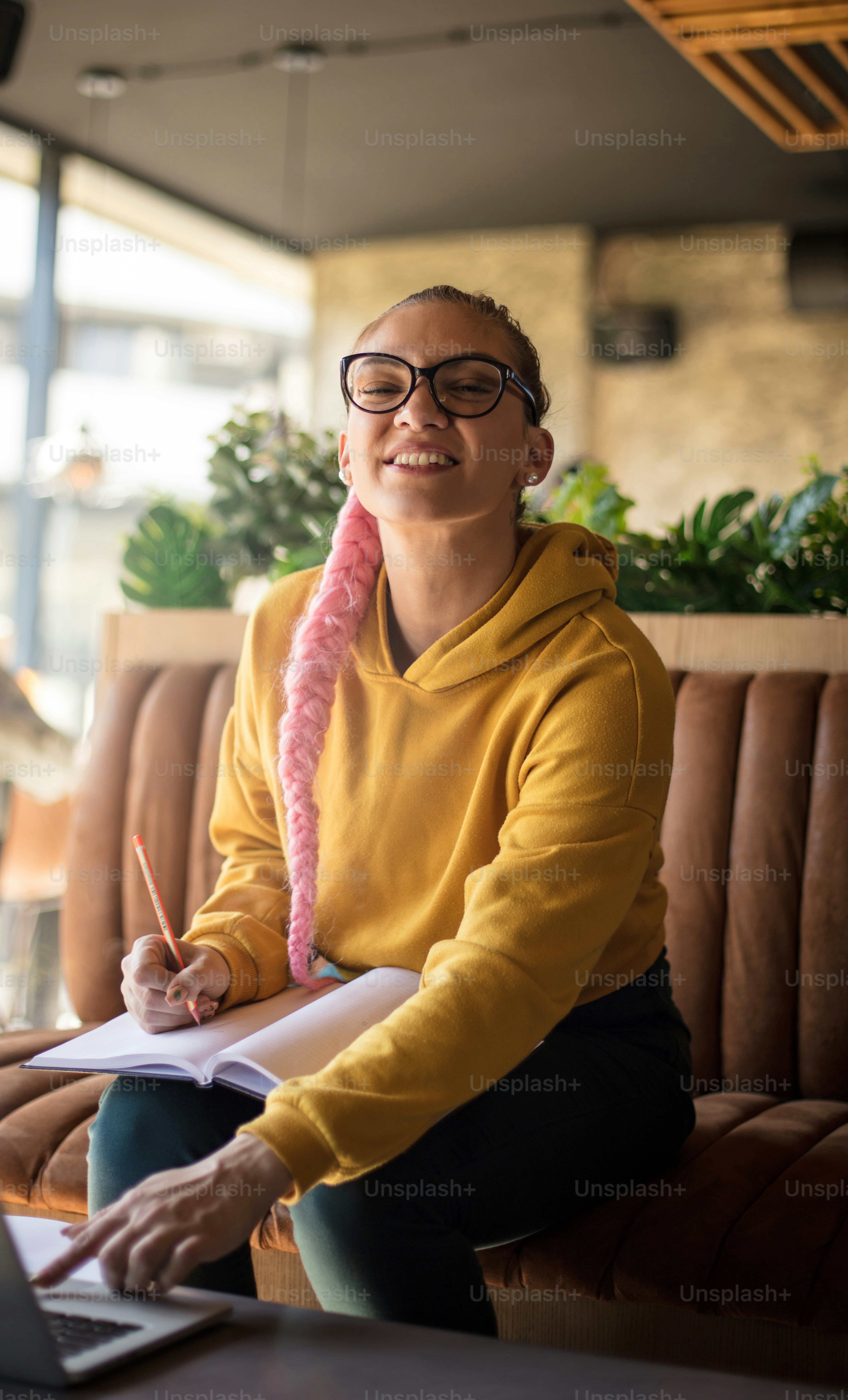 Happy student. Young student girl working at cafe. photo – Laptop Image ...
