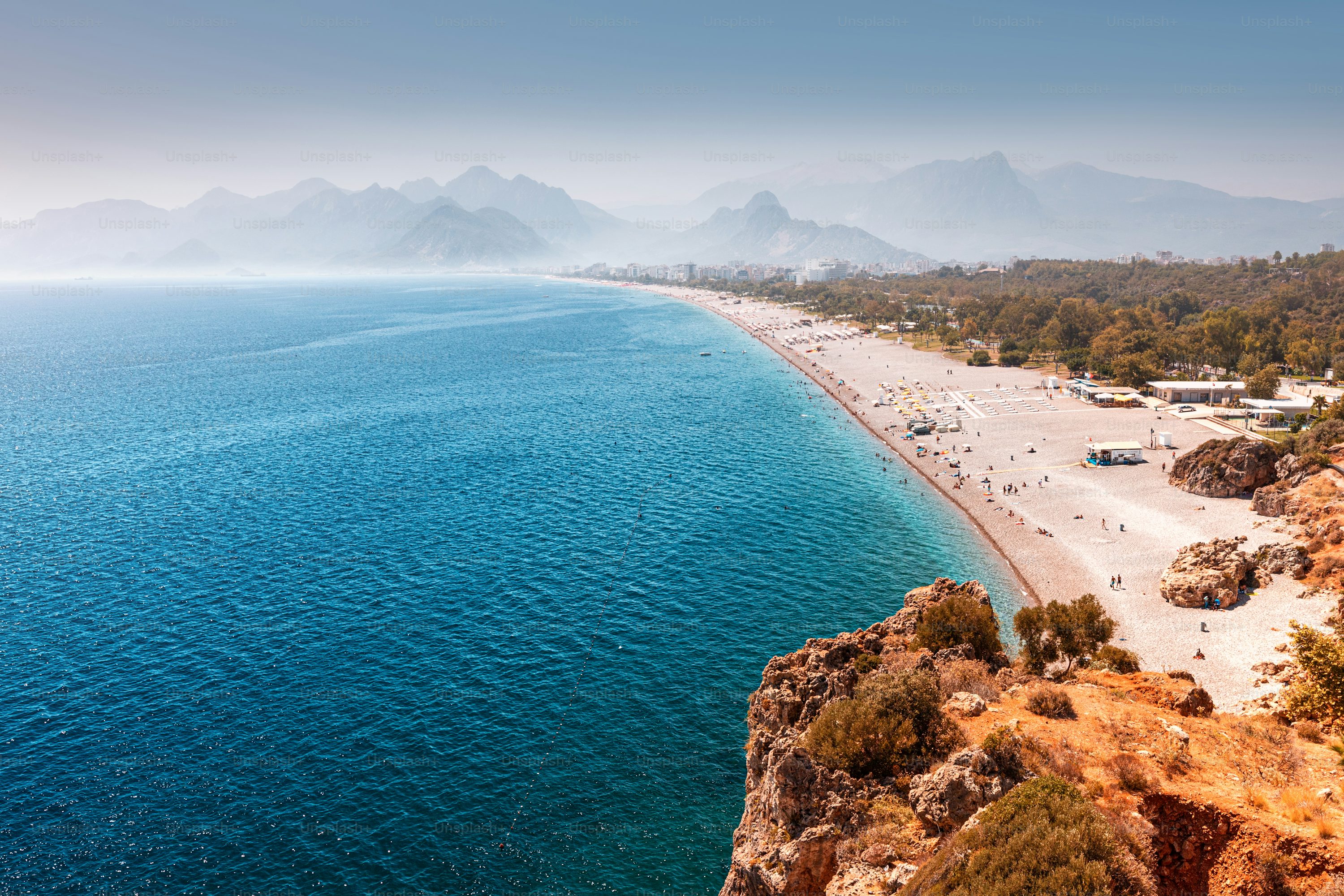 Aerial view of the famous longest Konyaalti beach in Antalya. Vacation ... Aerial view of the famous longest Konyaalti beach in Antalya. Vacation ...