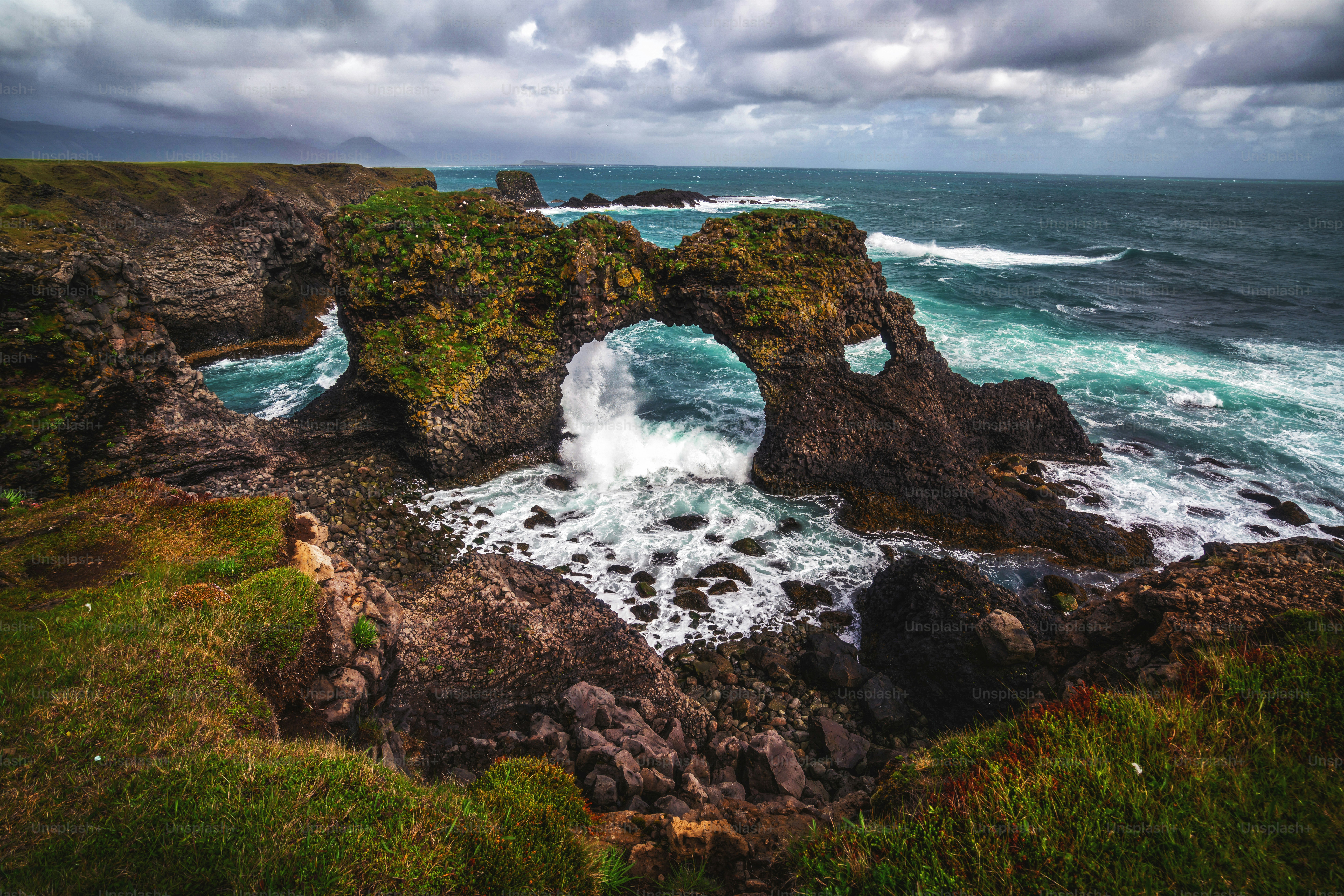 Amazing stone arch Gatklettur basalt rock on Atlantic coast of ...