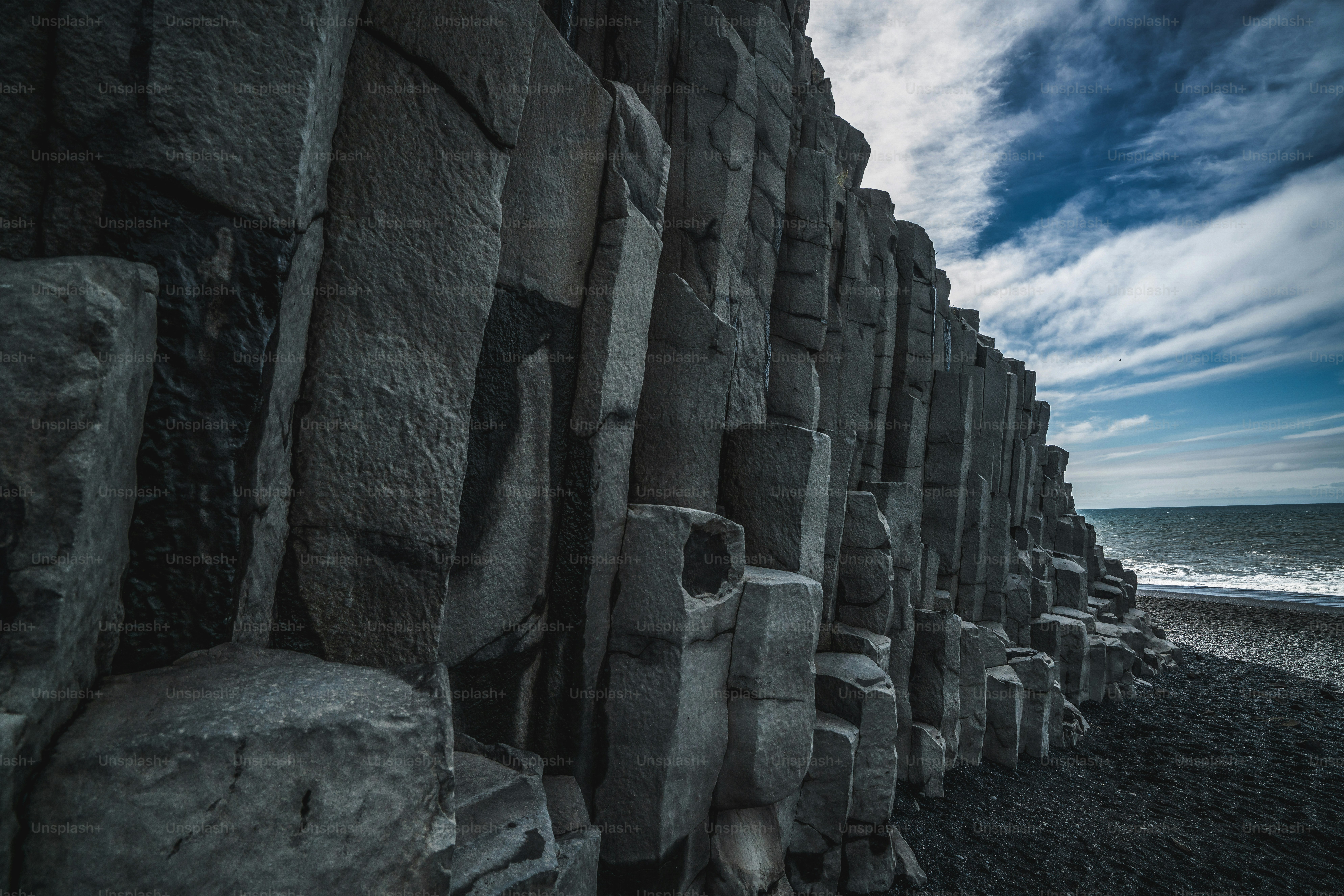 Beautiful and unique volcanic rock formation on Iceland black sand ...