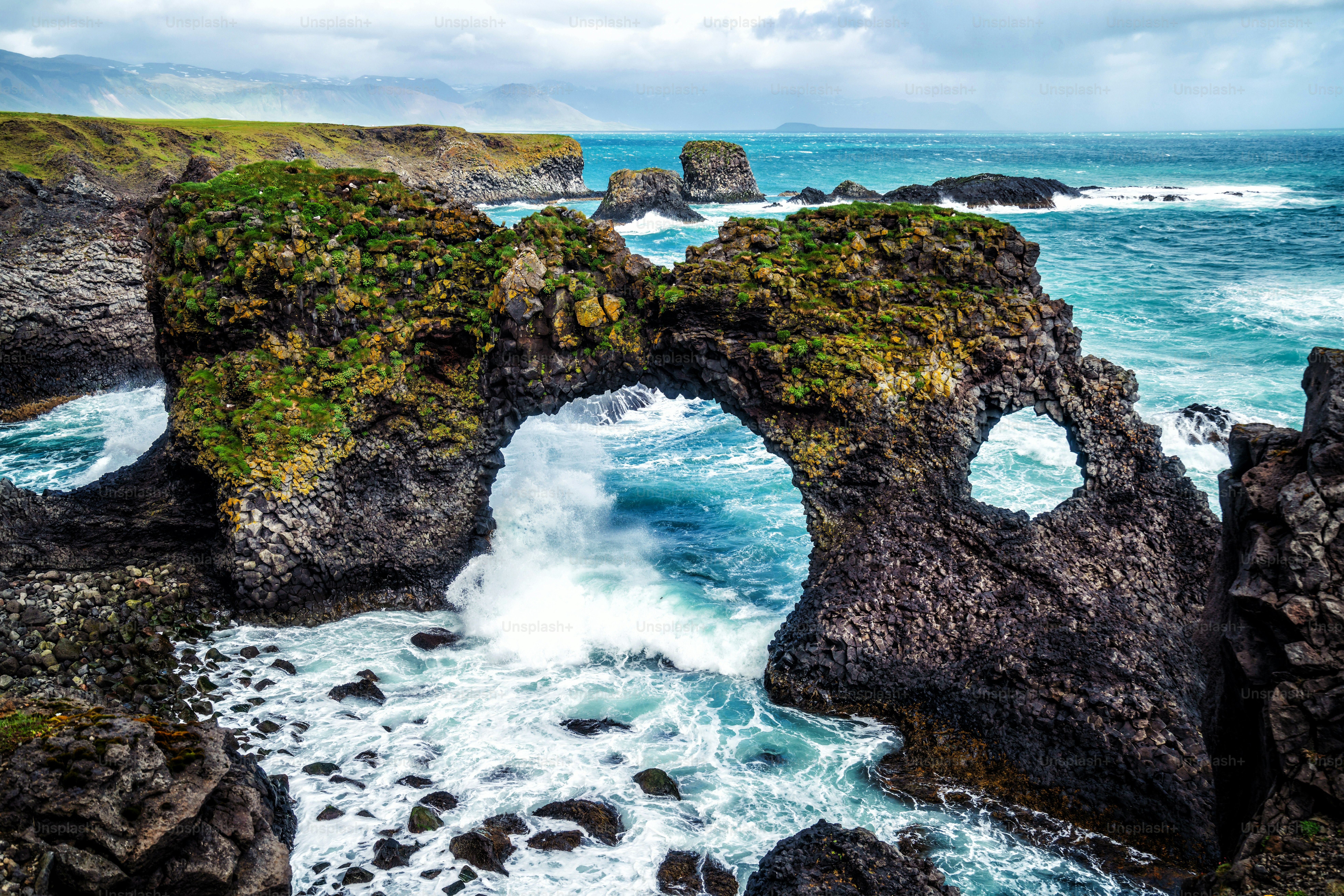 Amazing stone arch Gatklettur basalt rock on Atlantic coast of ...