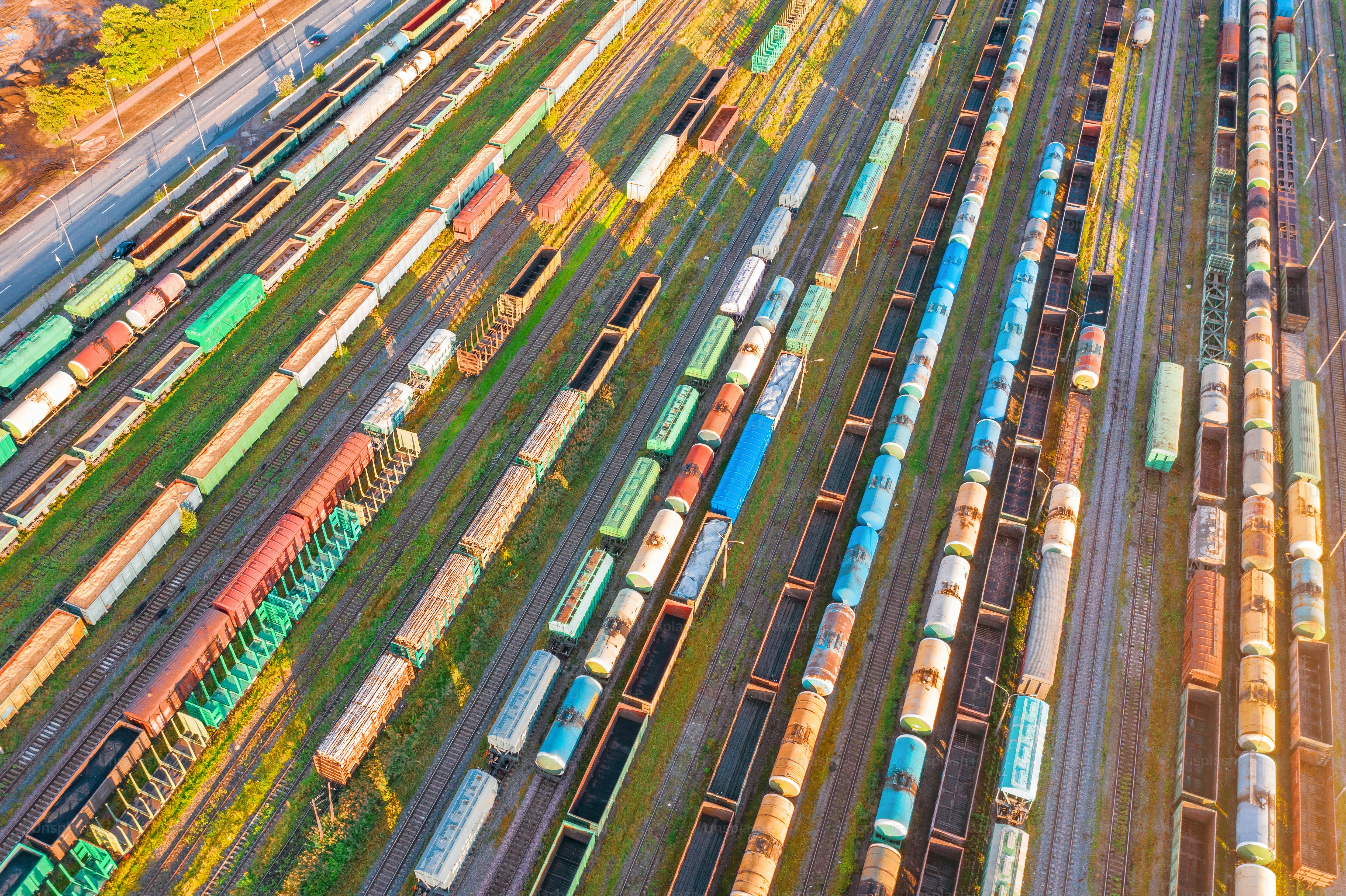 Aerial view of rail sorting freight station with railway cars, with ...