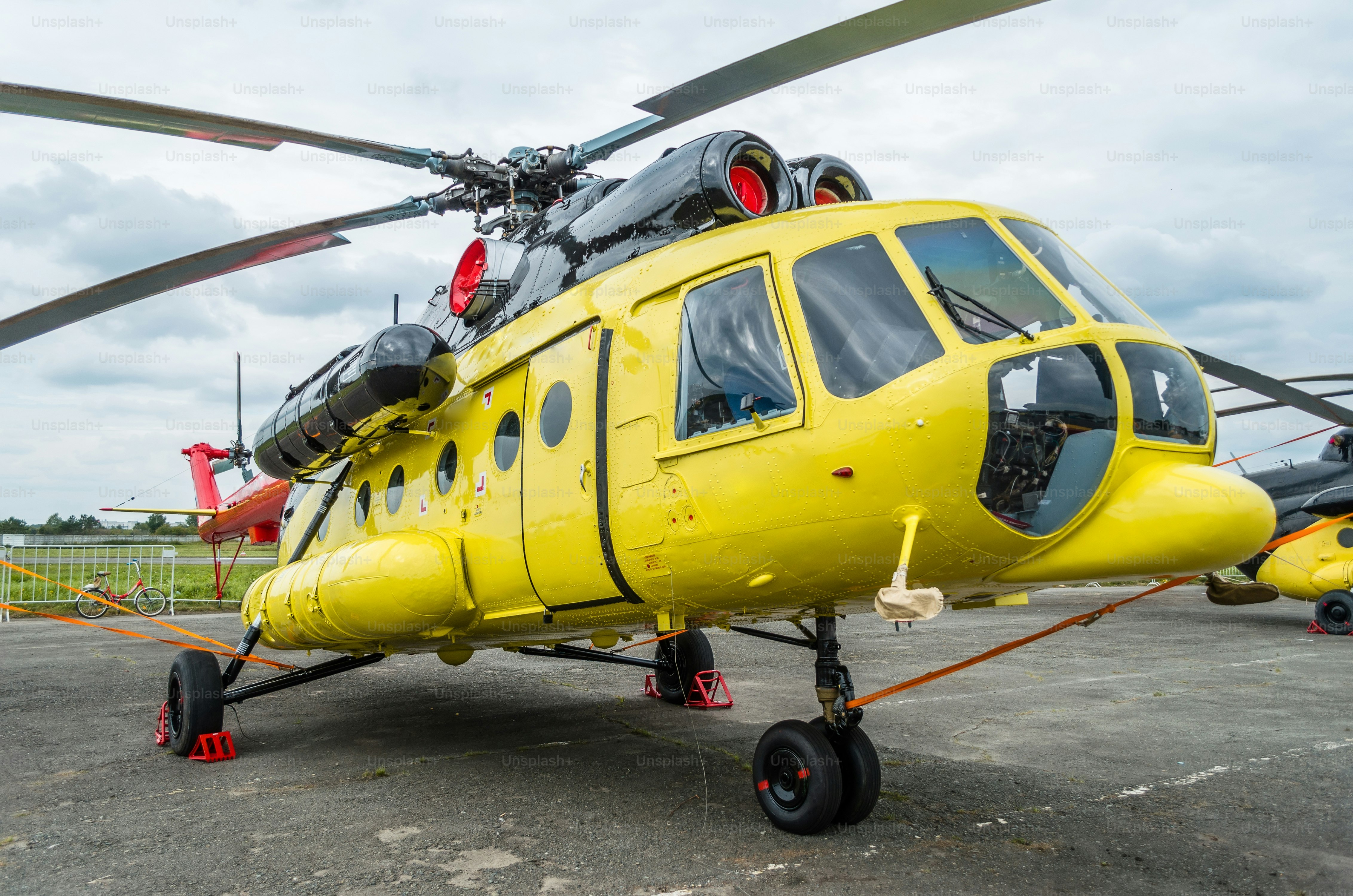 The sniper in disguise lies with a sniper rifle and aims at the ...