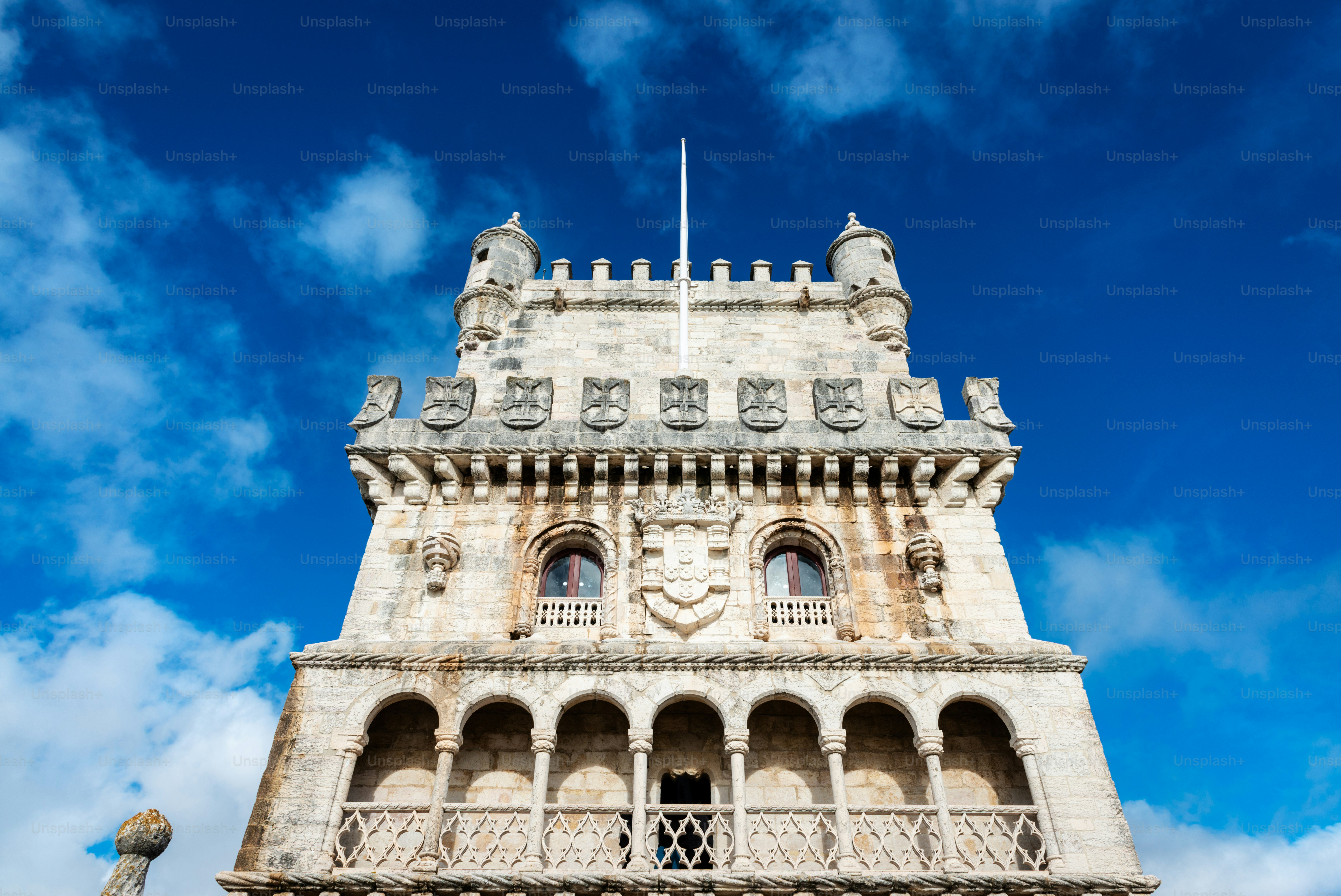 Side view of the Torre de Belém (built 16th century) by the Tagus River ...
