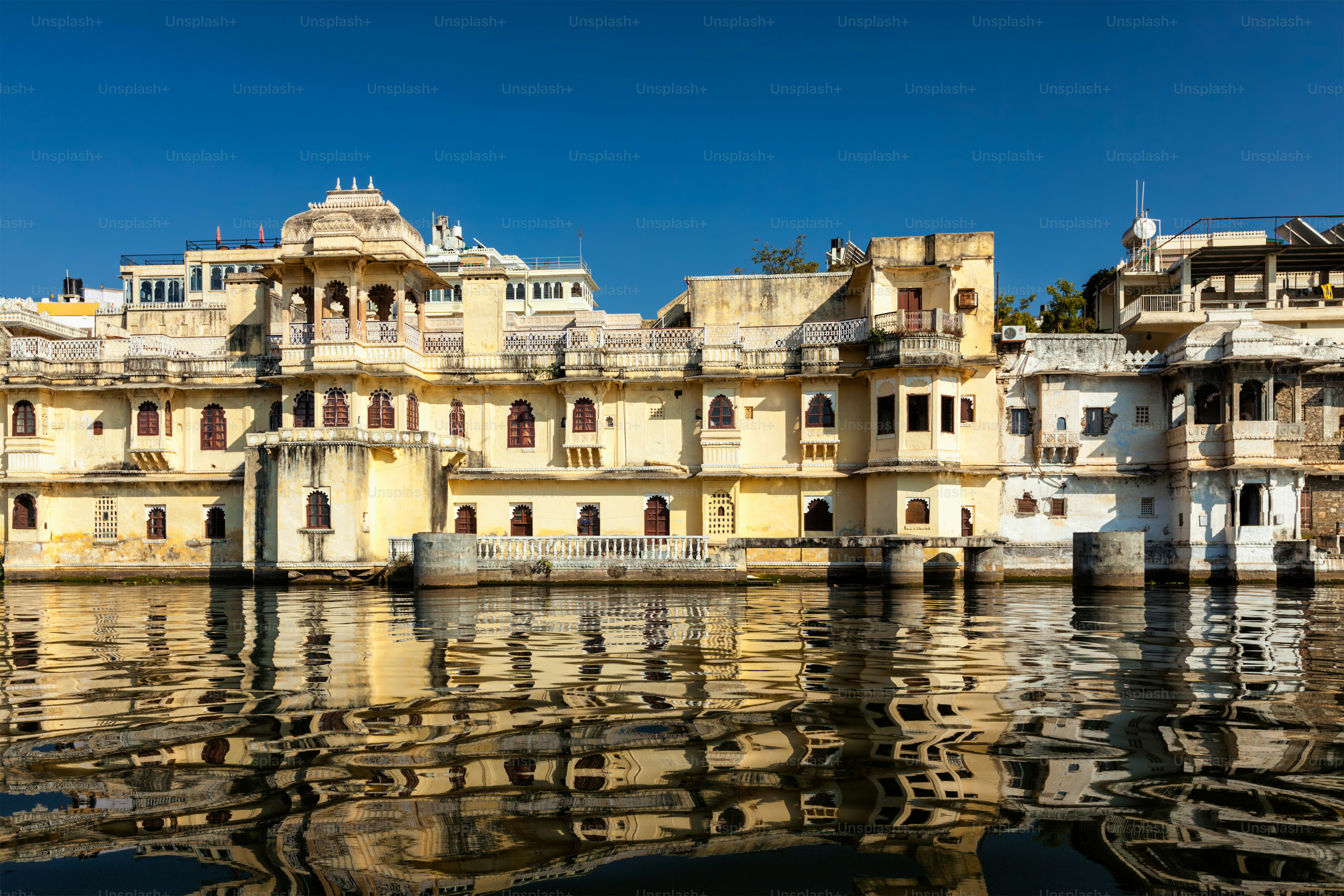 City Palace complex on Lake Pichola, Udaipur, Rajasthan, India photo ...