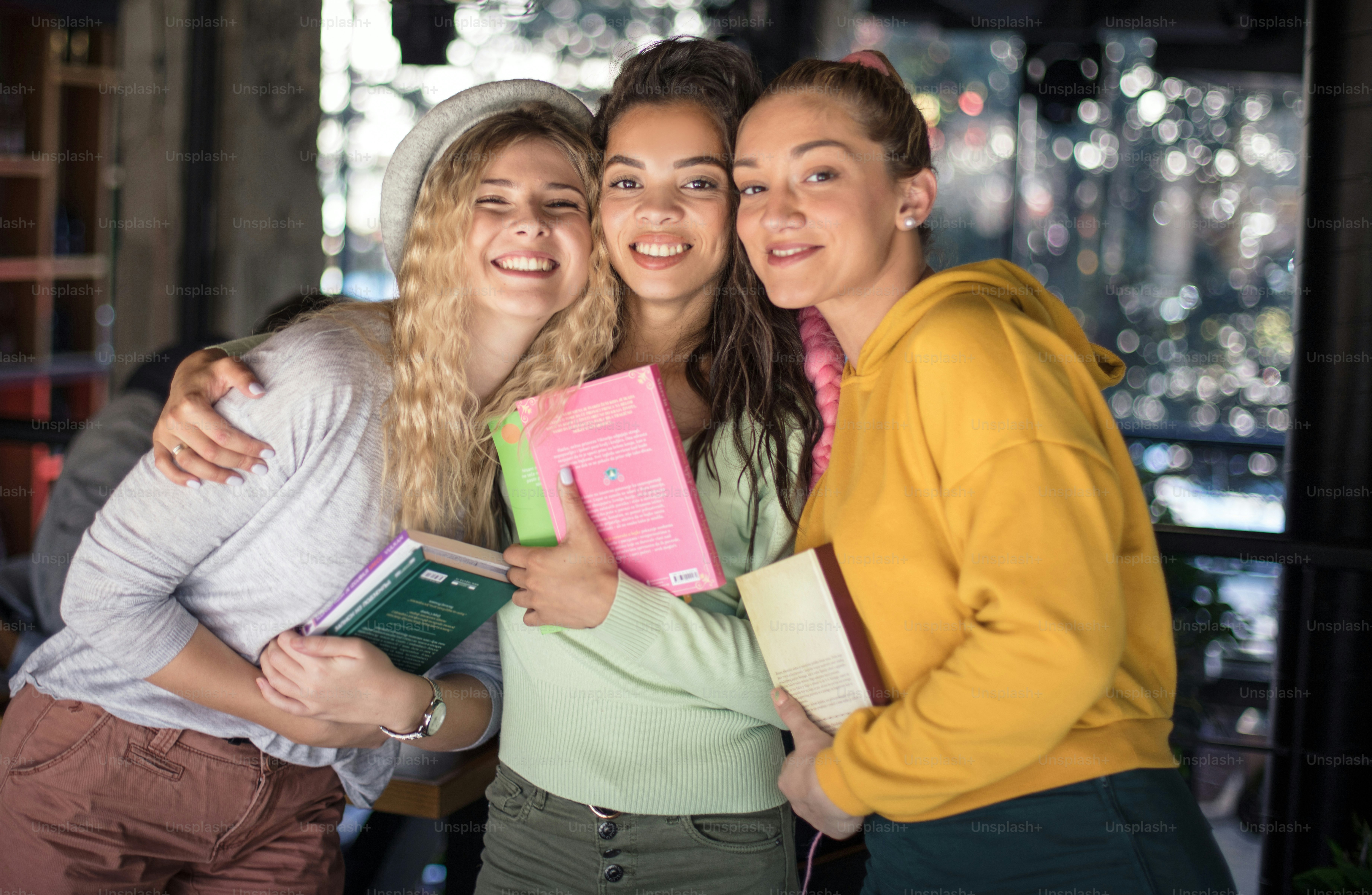 Always ready. Three student holding books. photo – Free Serbia Image on ...