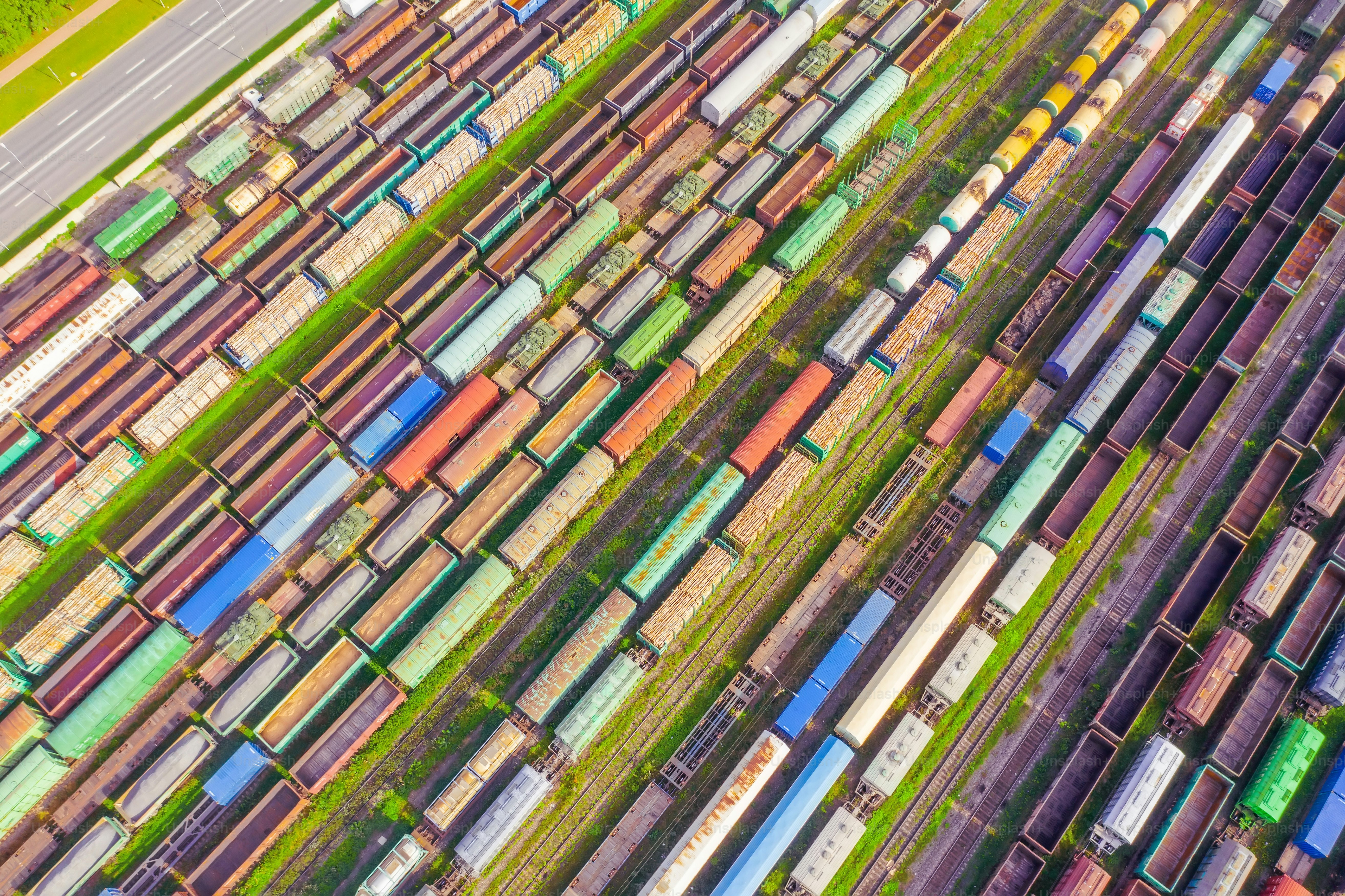 Top view of cargo railway carriage. Aerial view from flying drone of ...