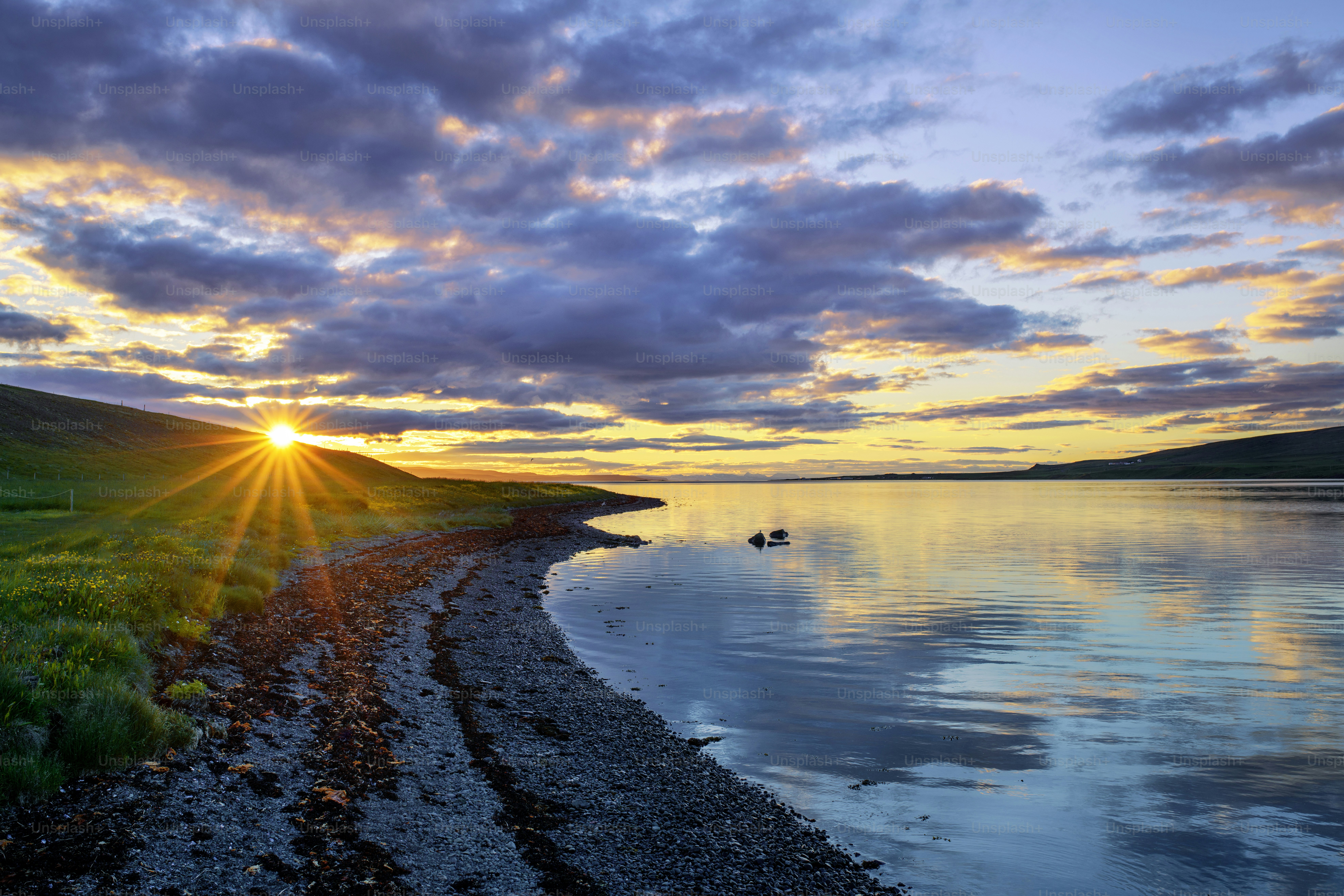 A beach and sea landscape in Iceland at sunset, Europe. photo – Passion ...