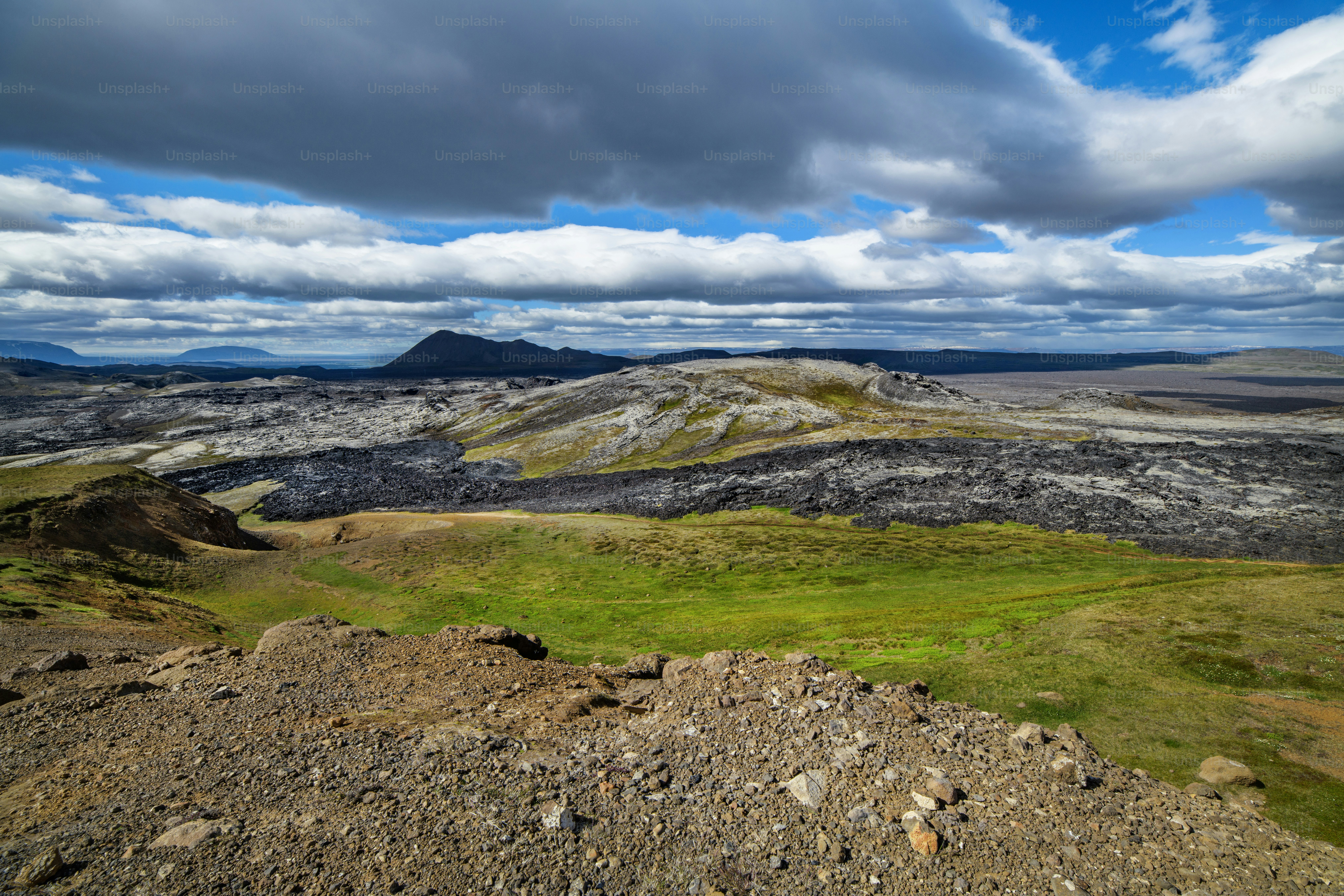 A beautiful Iceland landscape in summer with hills in the background ...