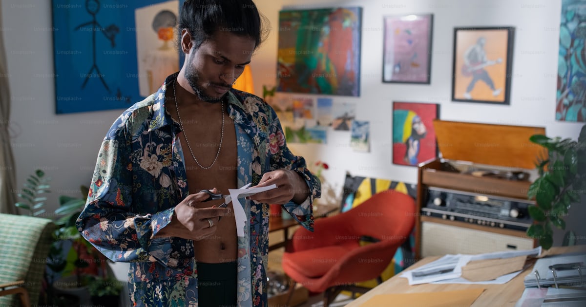 Medium portrait of handsome young artist wearing unbuttoned shirt ... Medium portrait of handsome young artist wearing unbuttoned shirt ...
