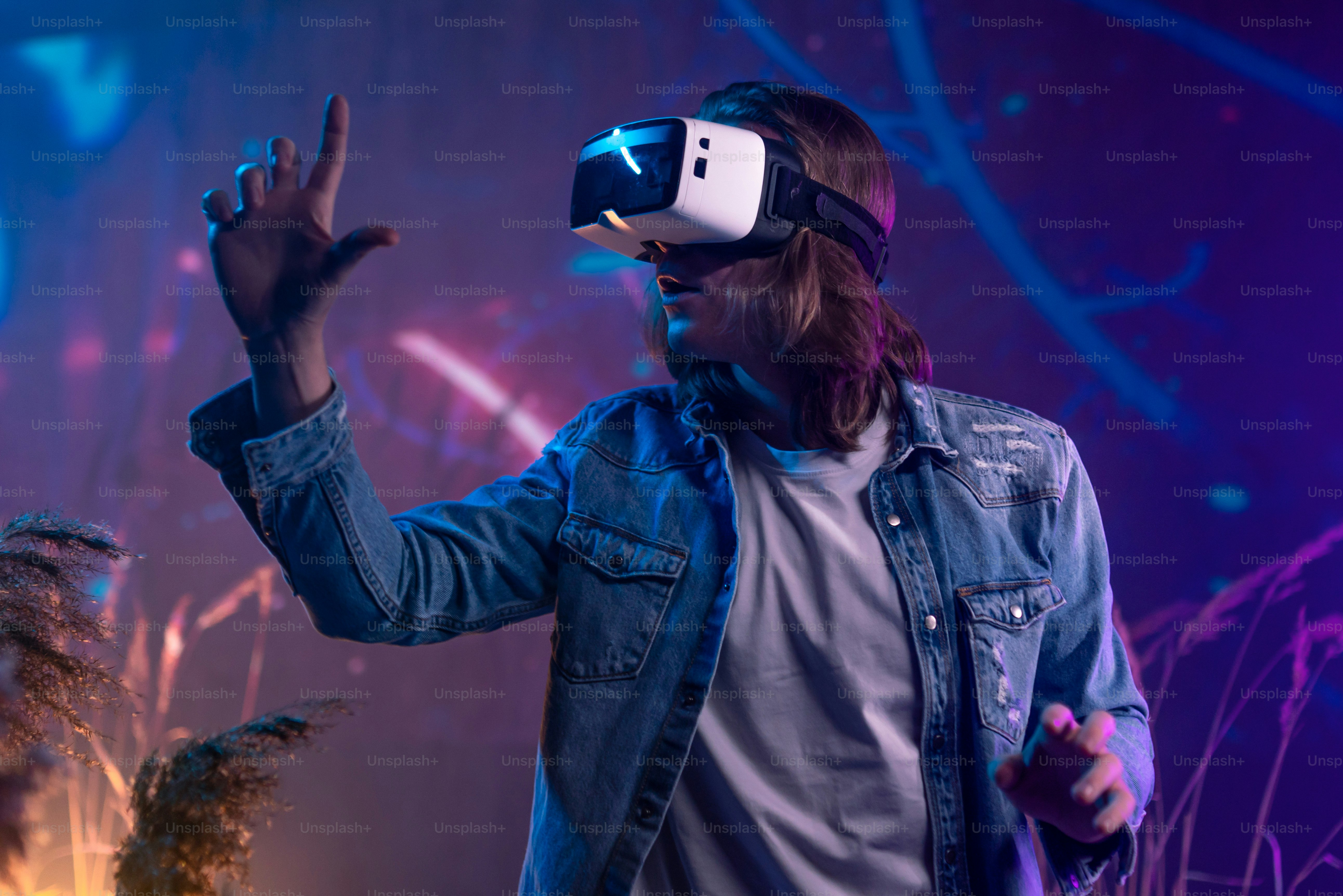 Metaverse digital cyber world technology, a man with virtual reality VR ...