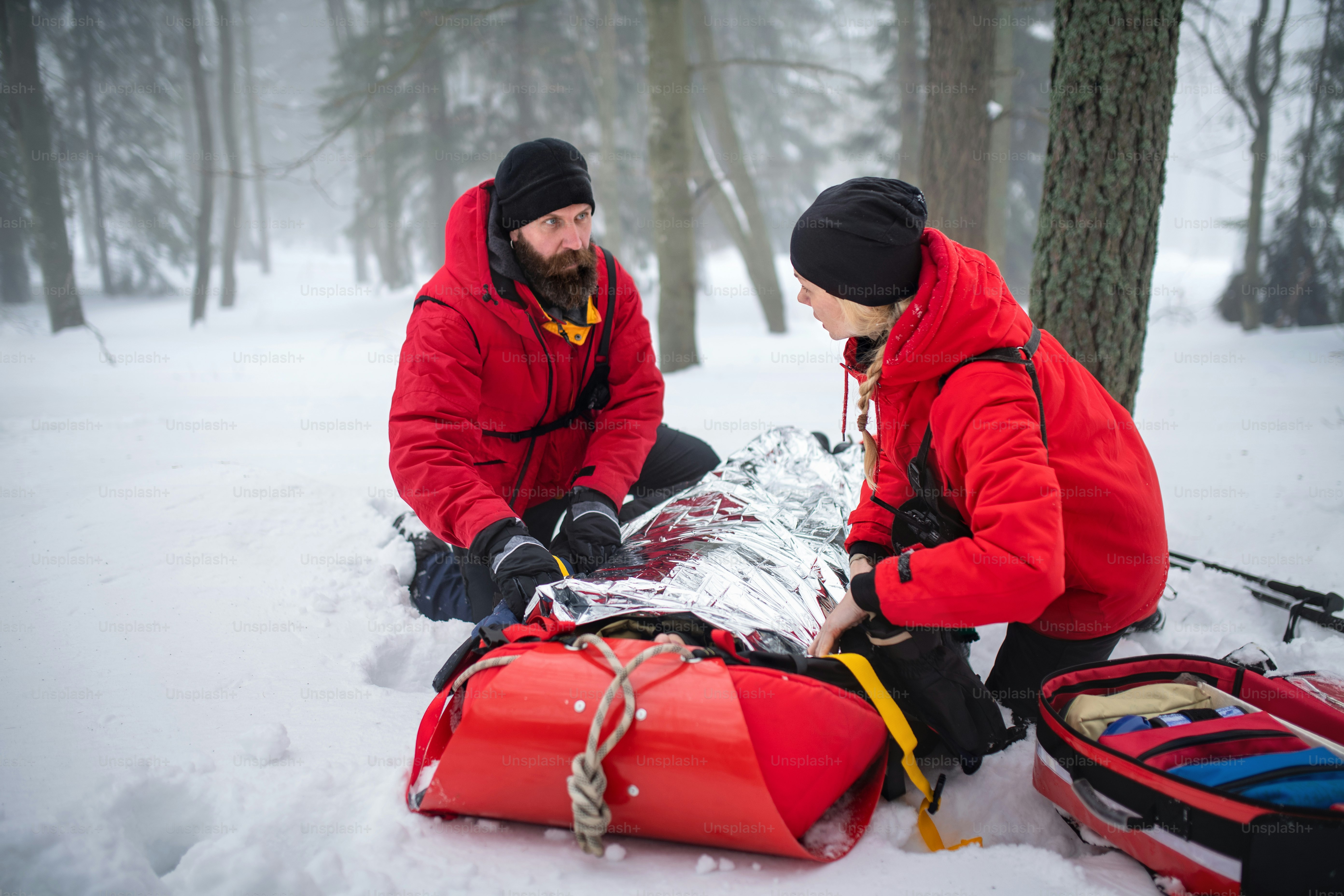 Paramedics from mountain rescue service provide operation outdoors in ...