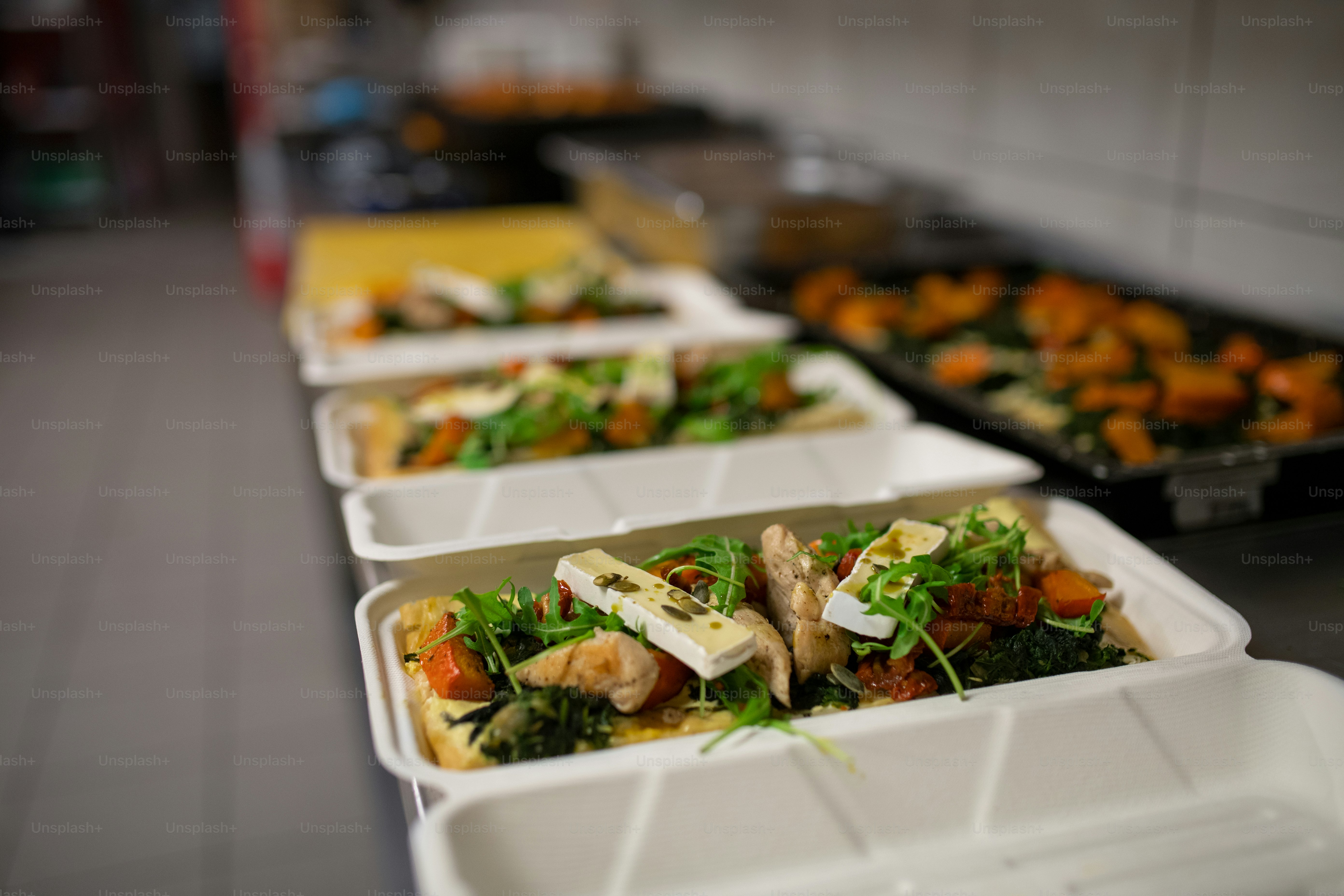 The meals containers prepared for take away in kitchen restaurant ...