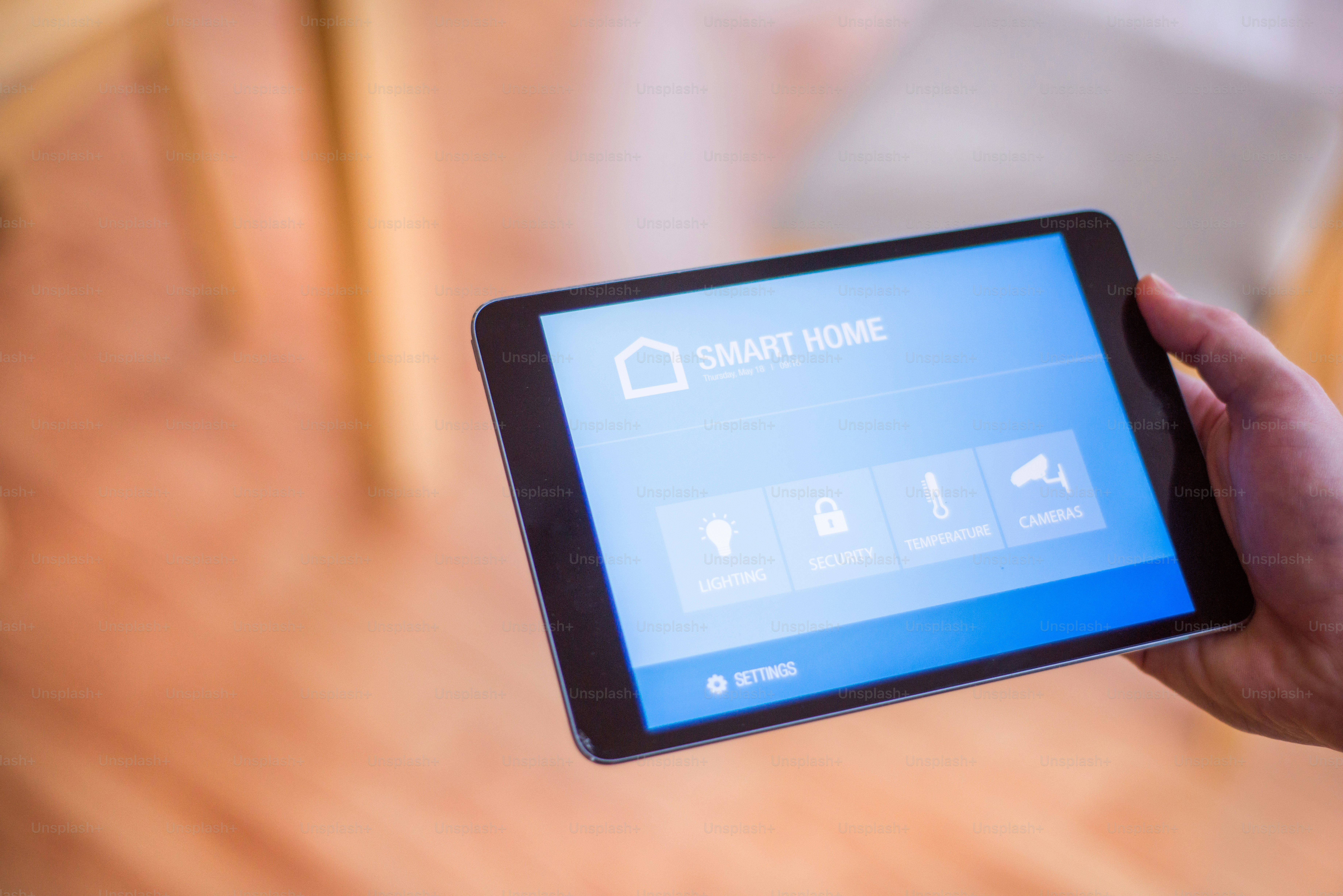 A tablet with smart home control system.A tablet with smart home ...