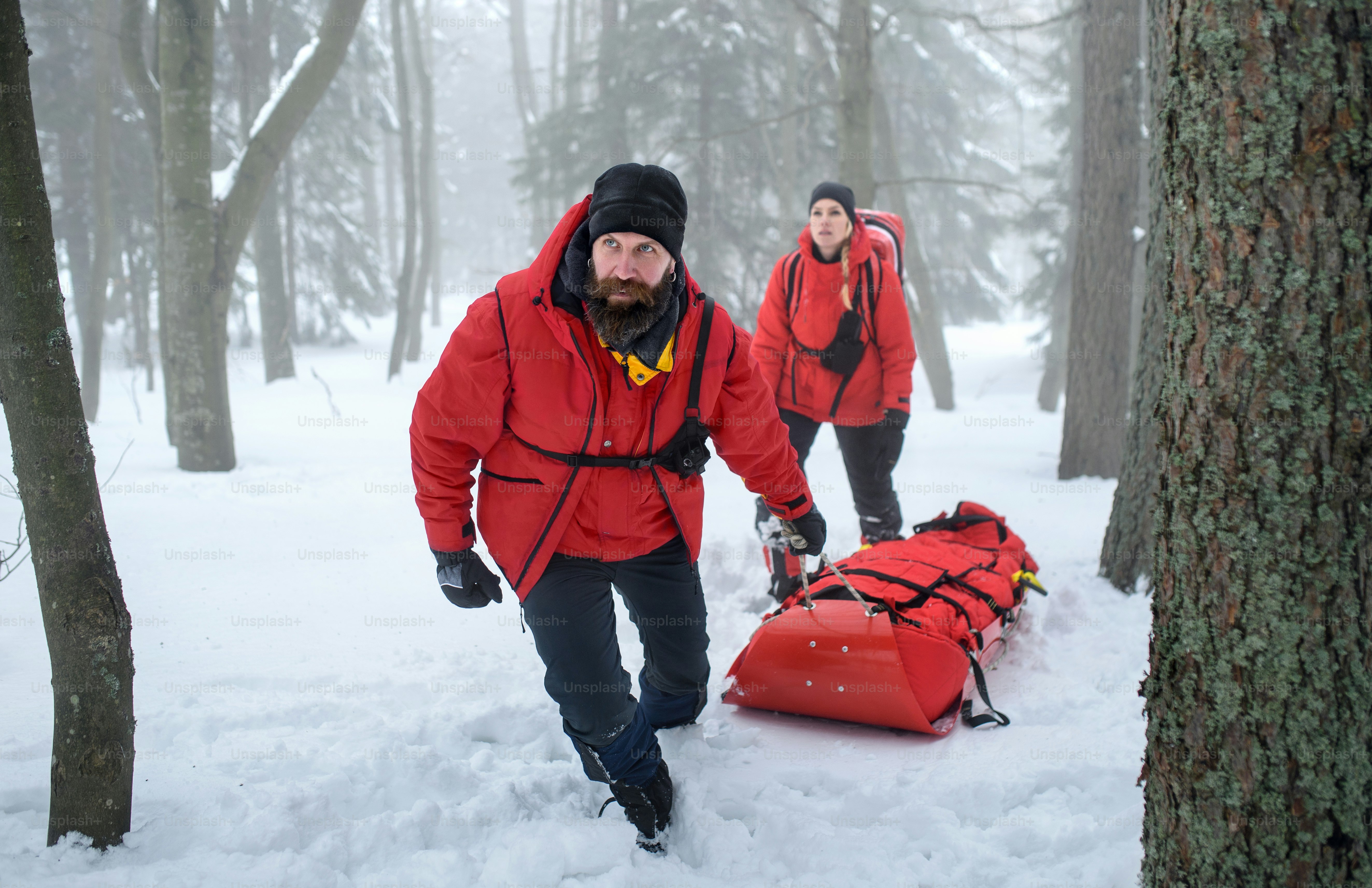 Paramedics from mountain rescue service provide operation outdoors in ...