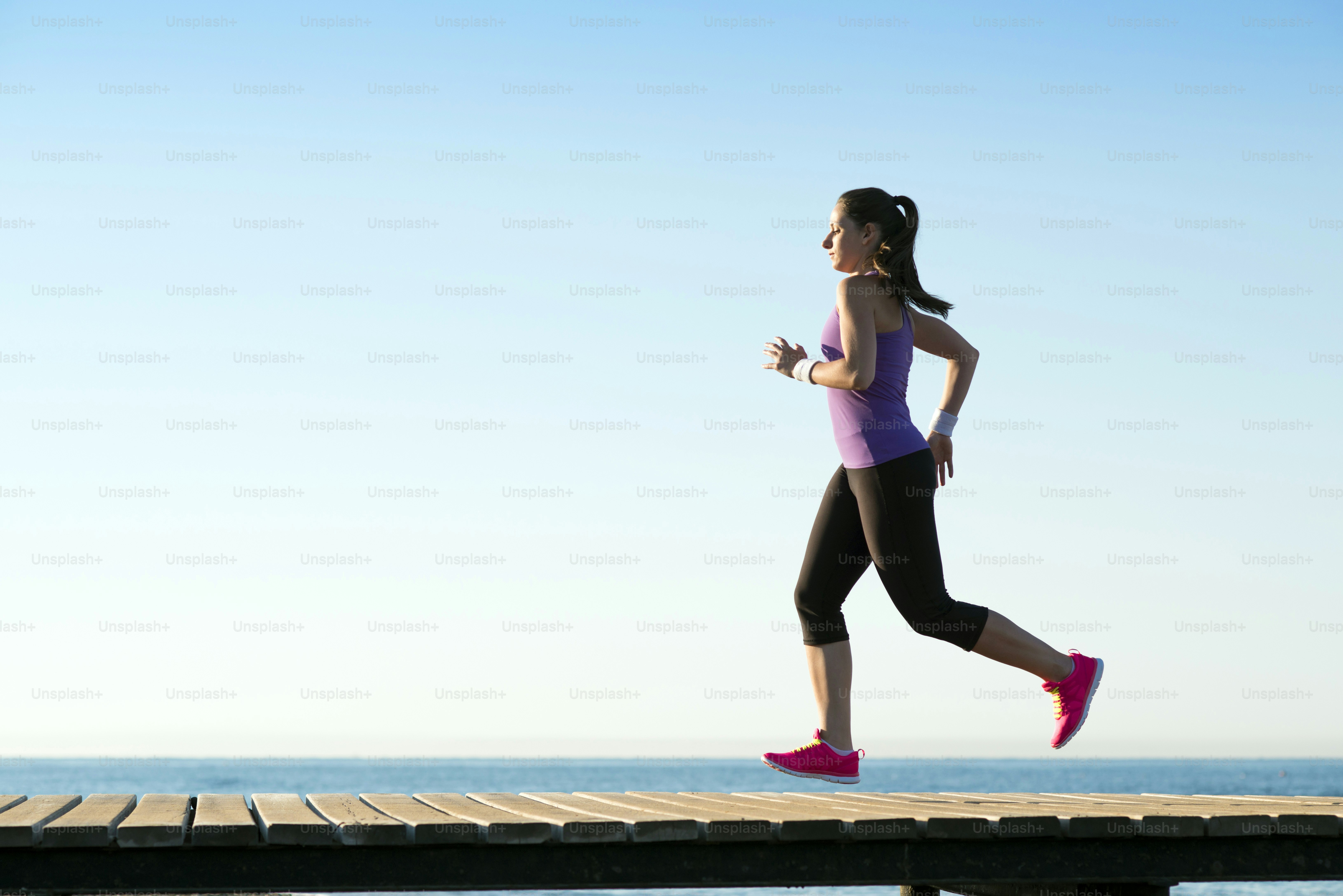 Young woman is running in sunny nature photo – Jogging Image on Unsplash