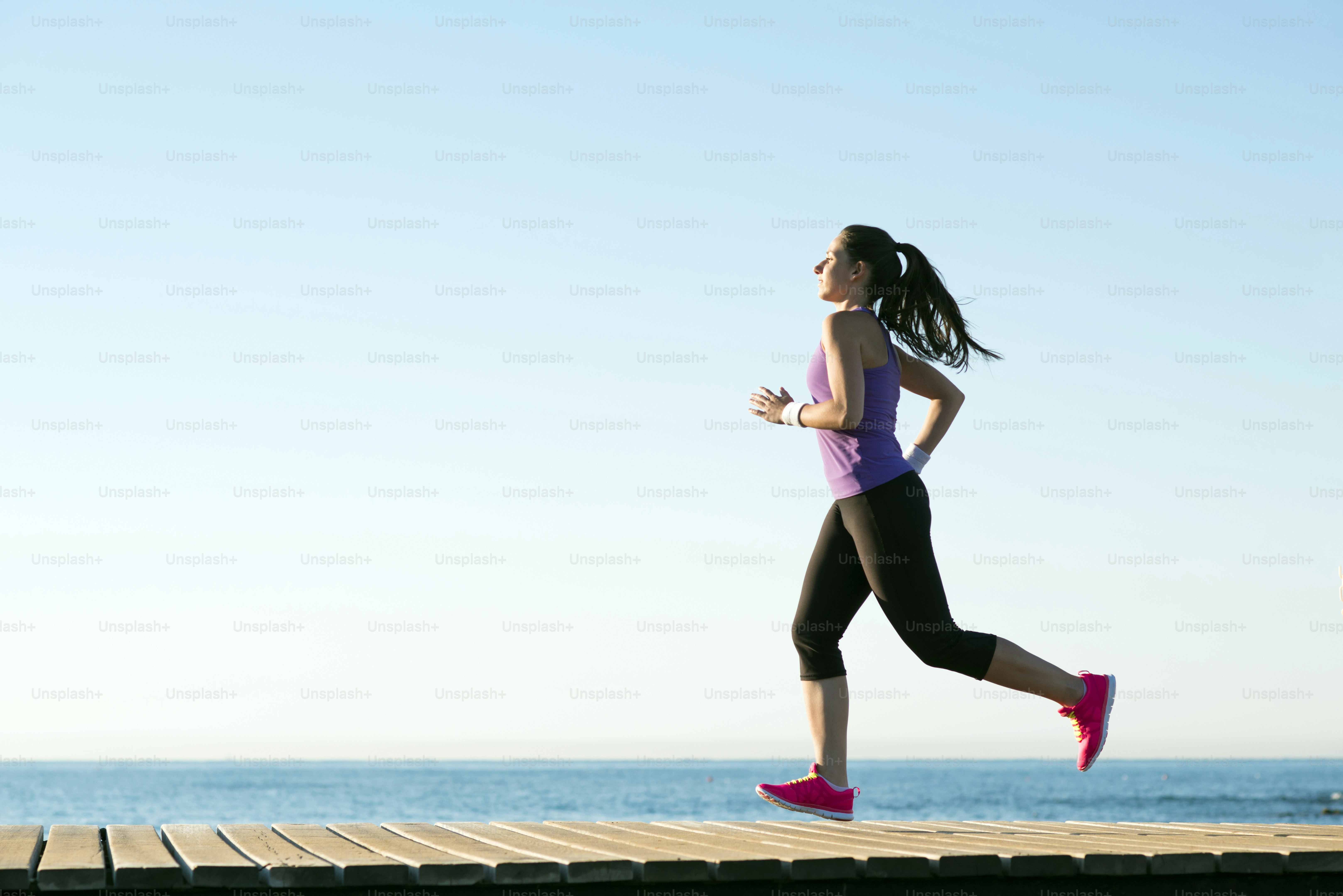 Young woman is running in sunny nature photo – Relaxation exercise ...